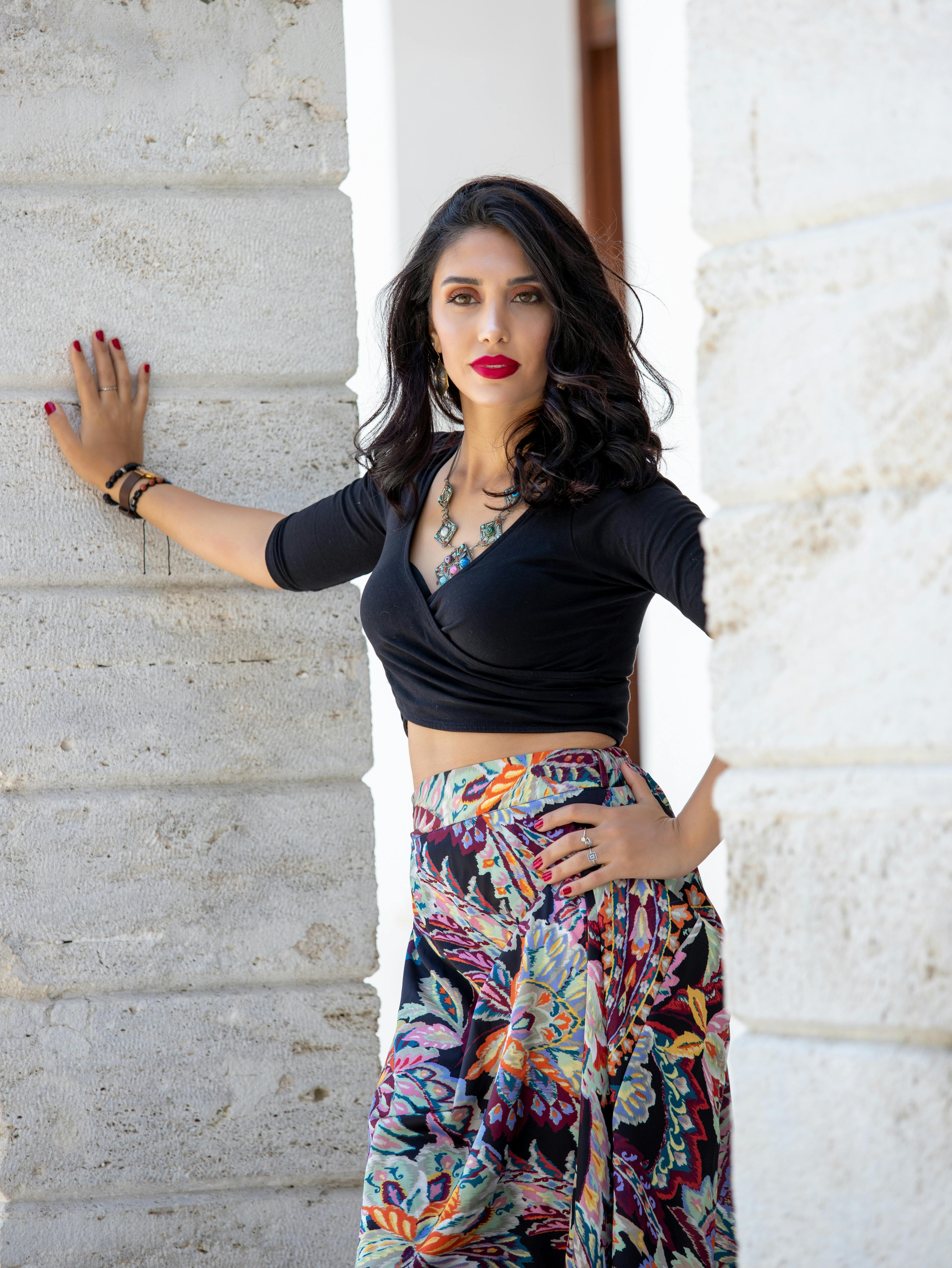 Brunette Woman Posing in Skirt · Free Stock Photo