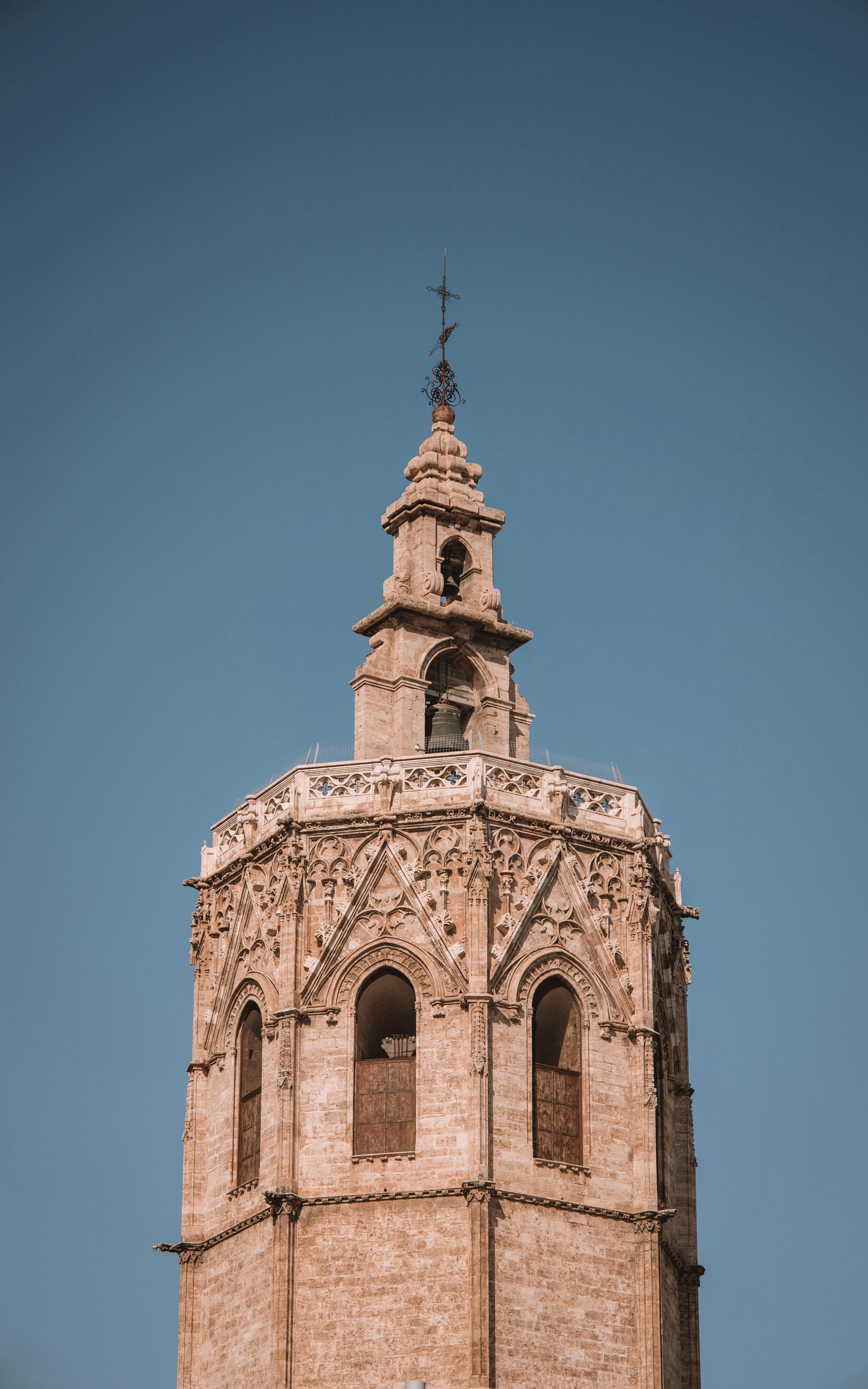 Gothic Historic Building Tower against Blue Sky · Free Stock Photo