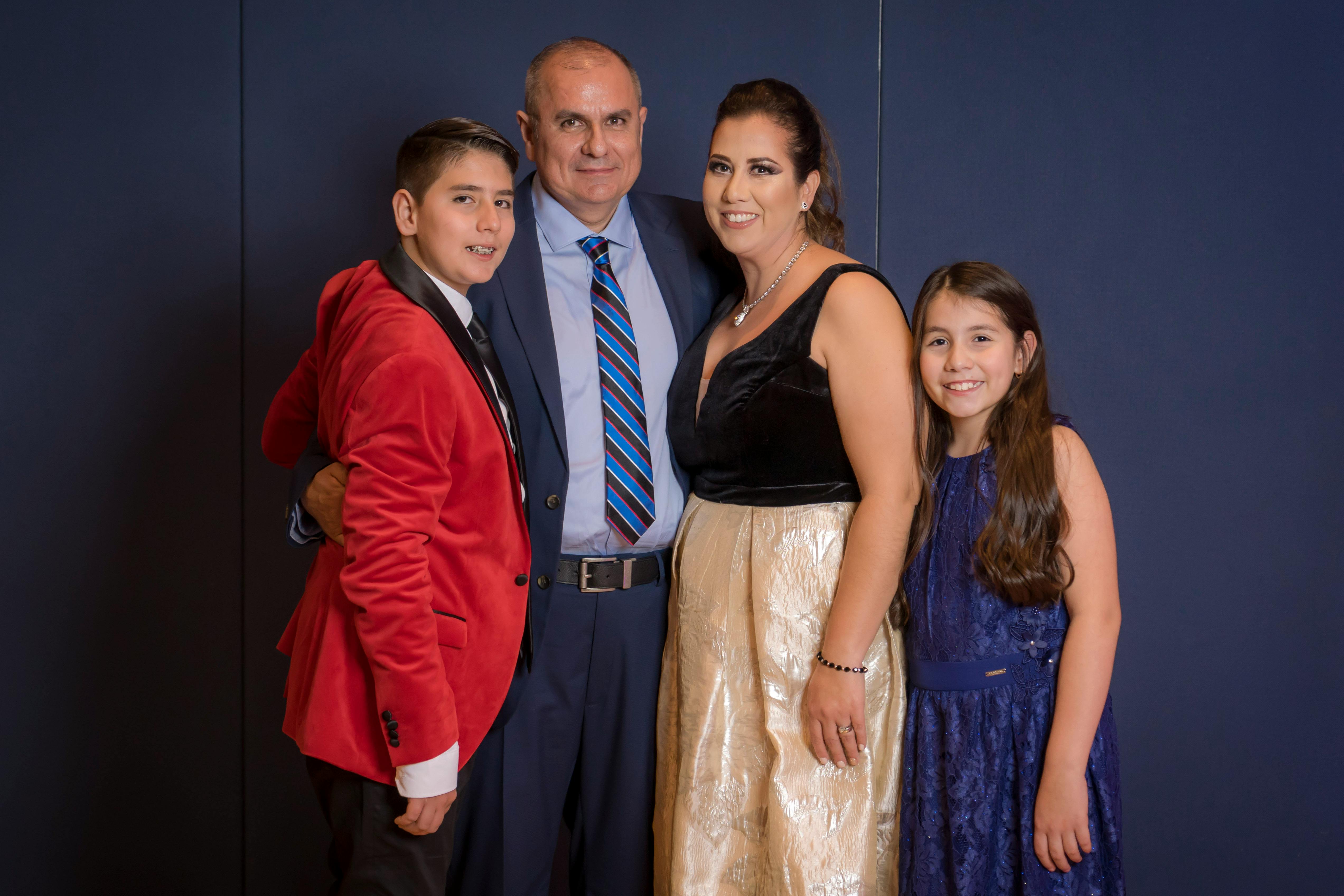 Smiling Standing Family · Free Stock Photo