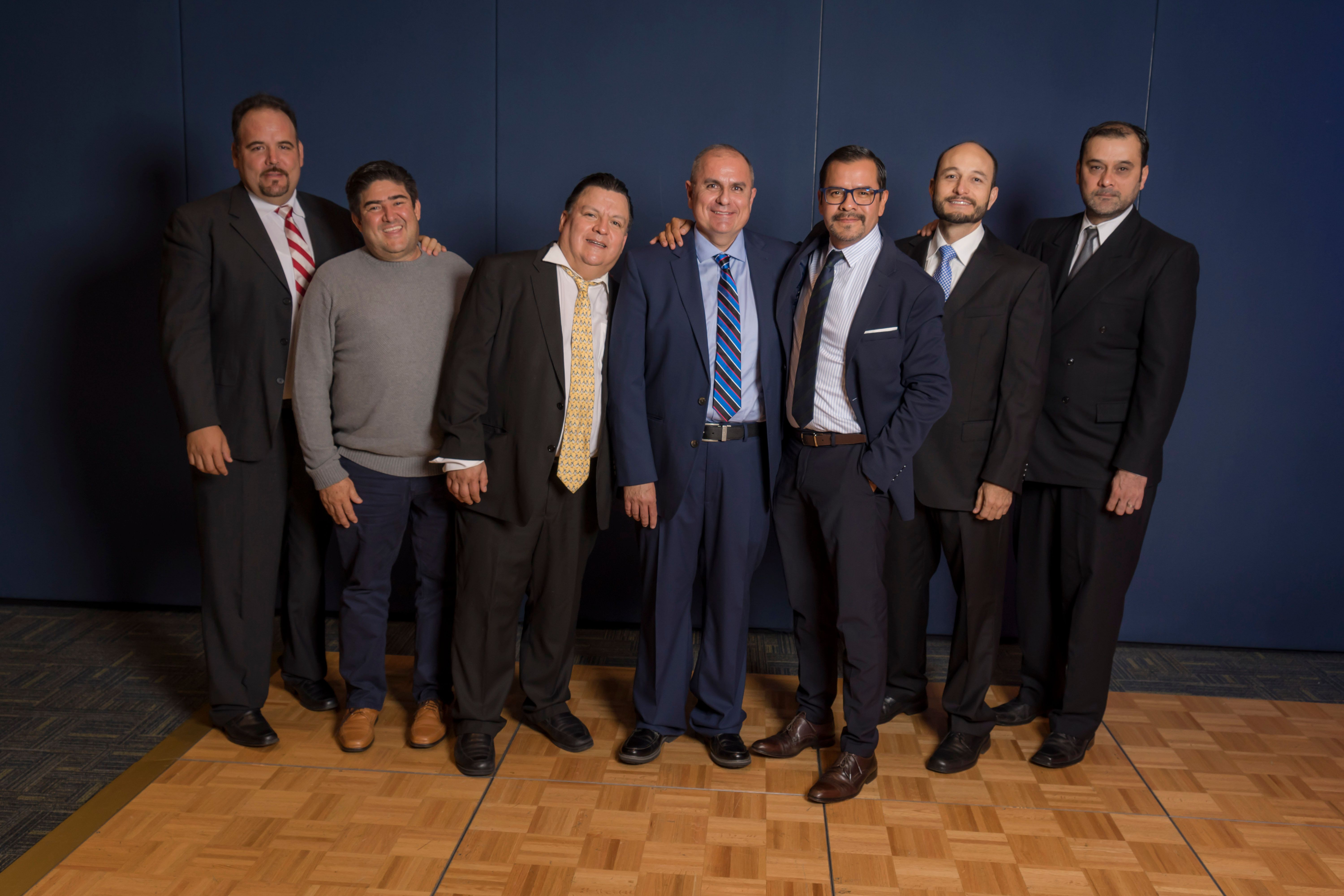 Men Standing in Suits · Free Stock Photo