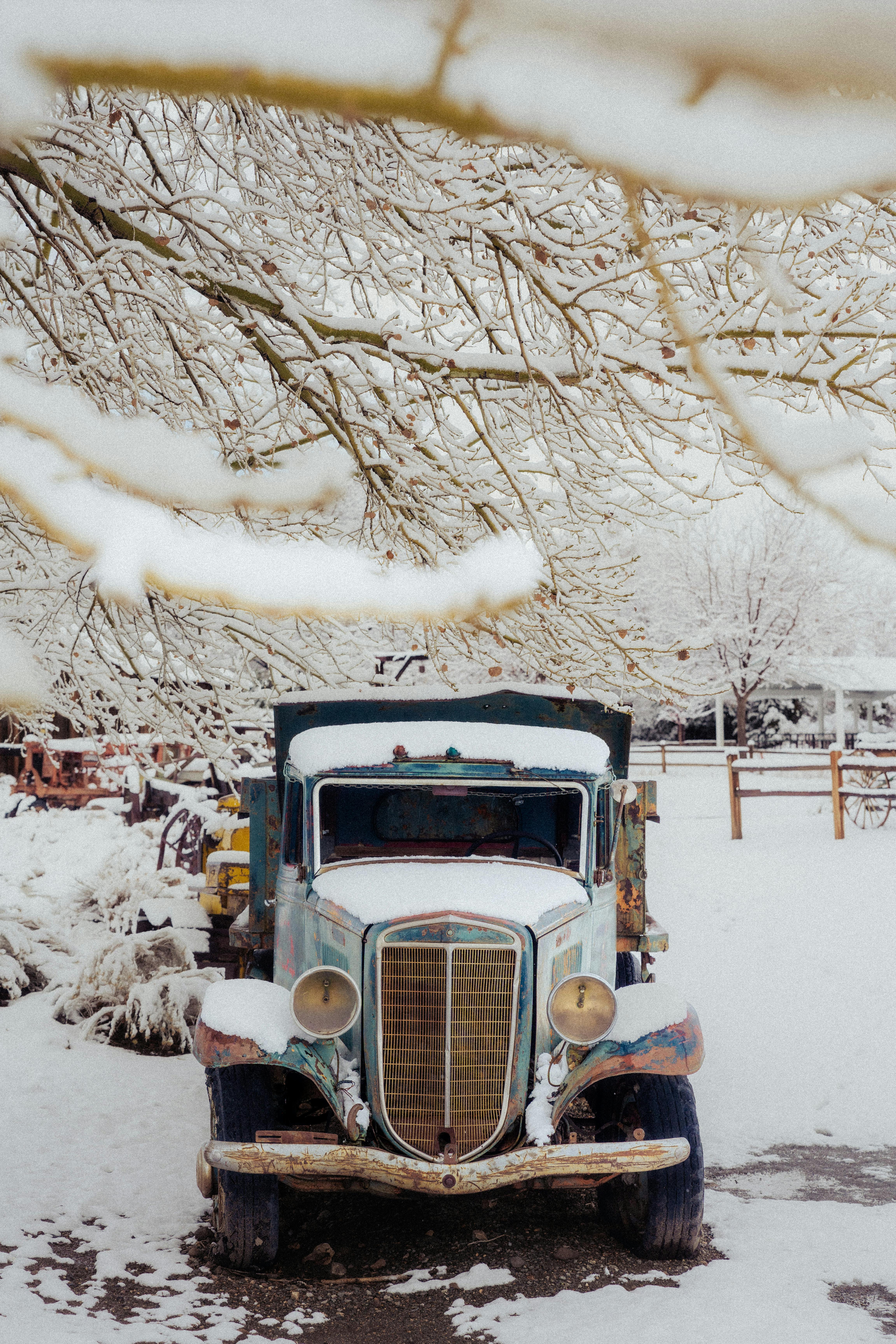 Old Rusty Car Covered in Snow · Free Stock Photo