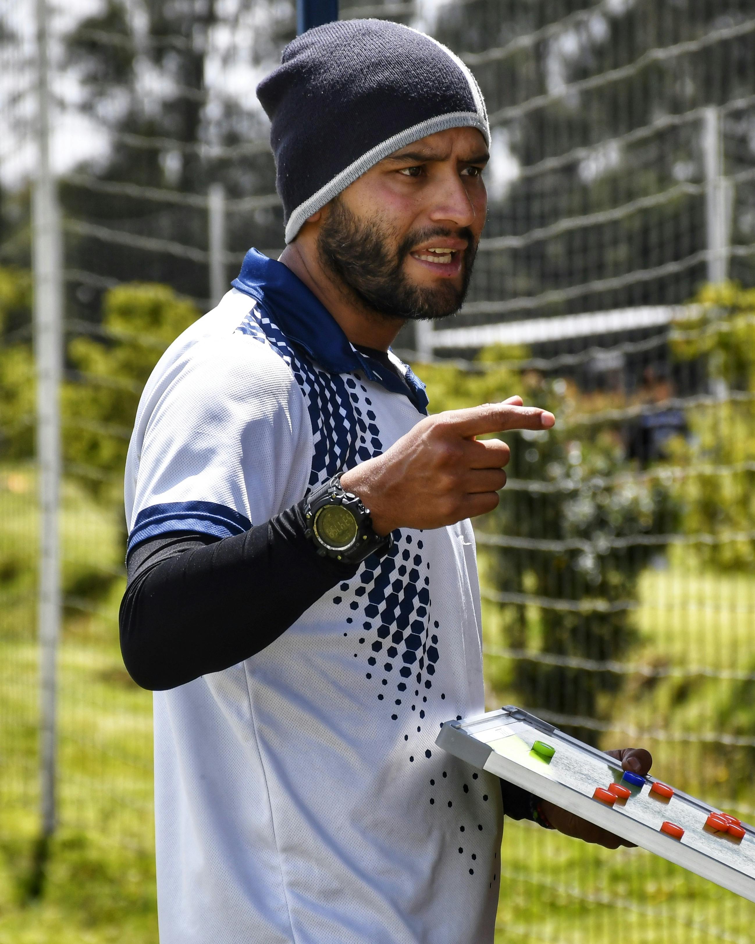 Trainer Explaining a Game Strategy · Free Stock Photo