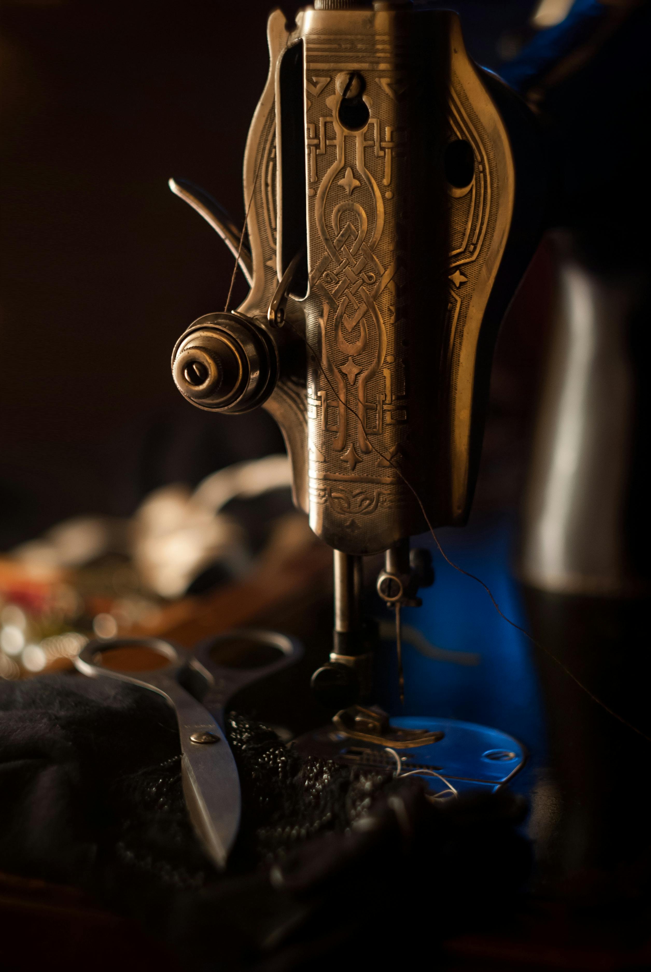 A Close-Up Shot of a Sewing Machine · Free Stock Photo