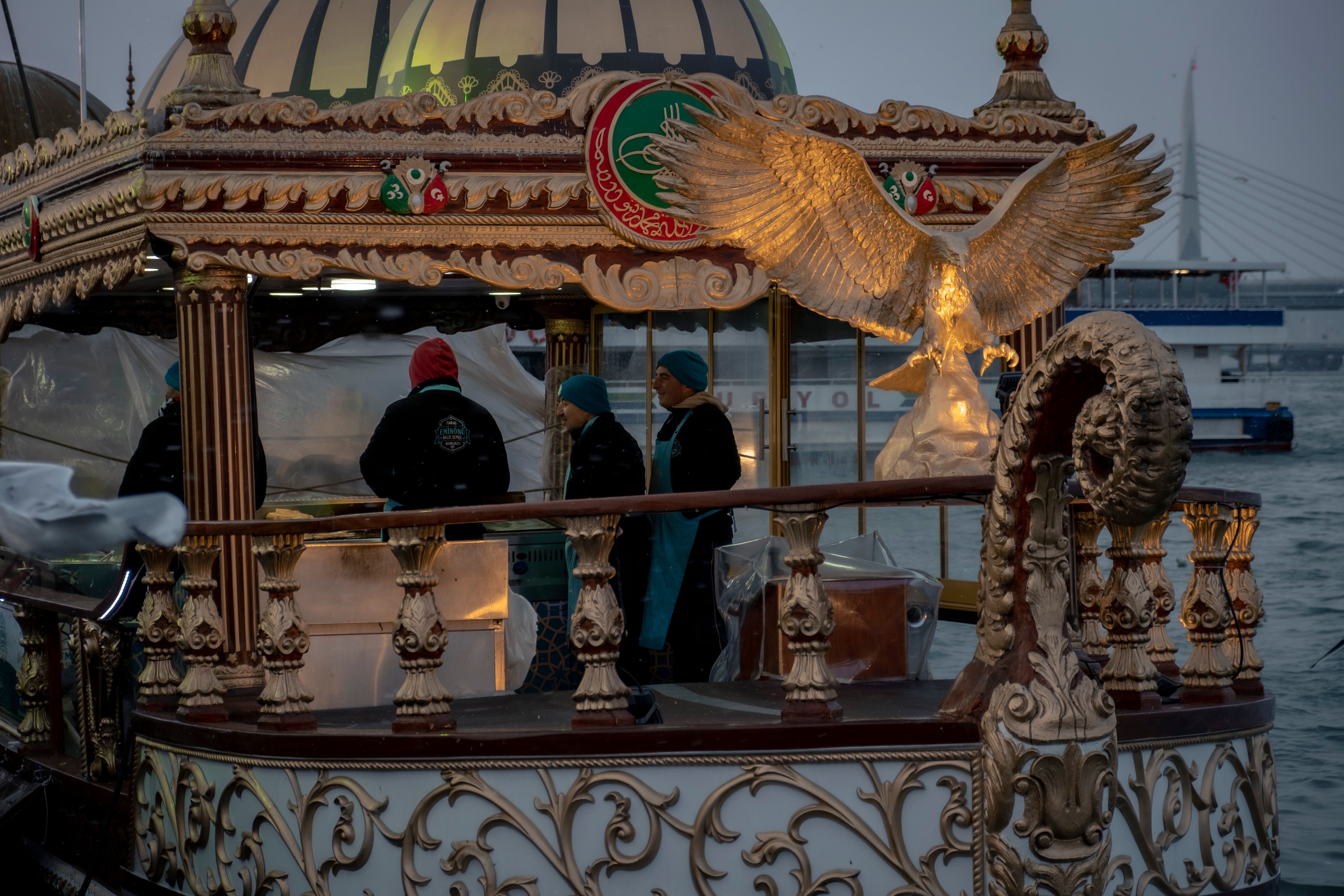 Men Standing on Well Decorated Ship with Statues of Eagle · Free Stock ...