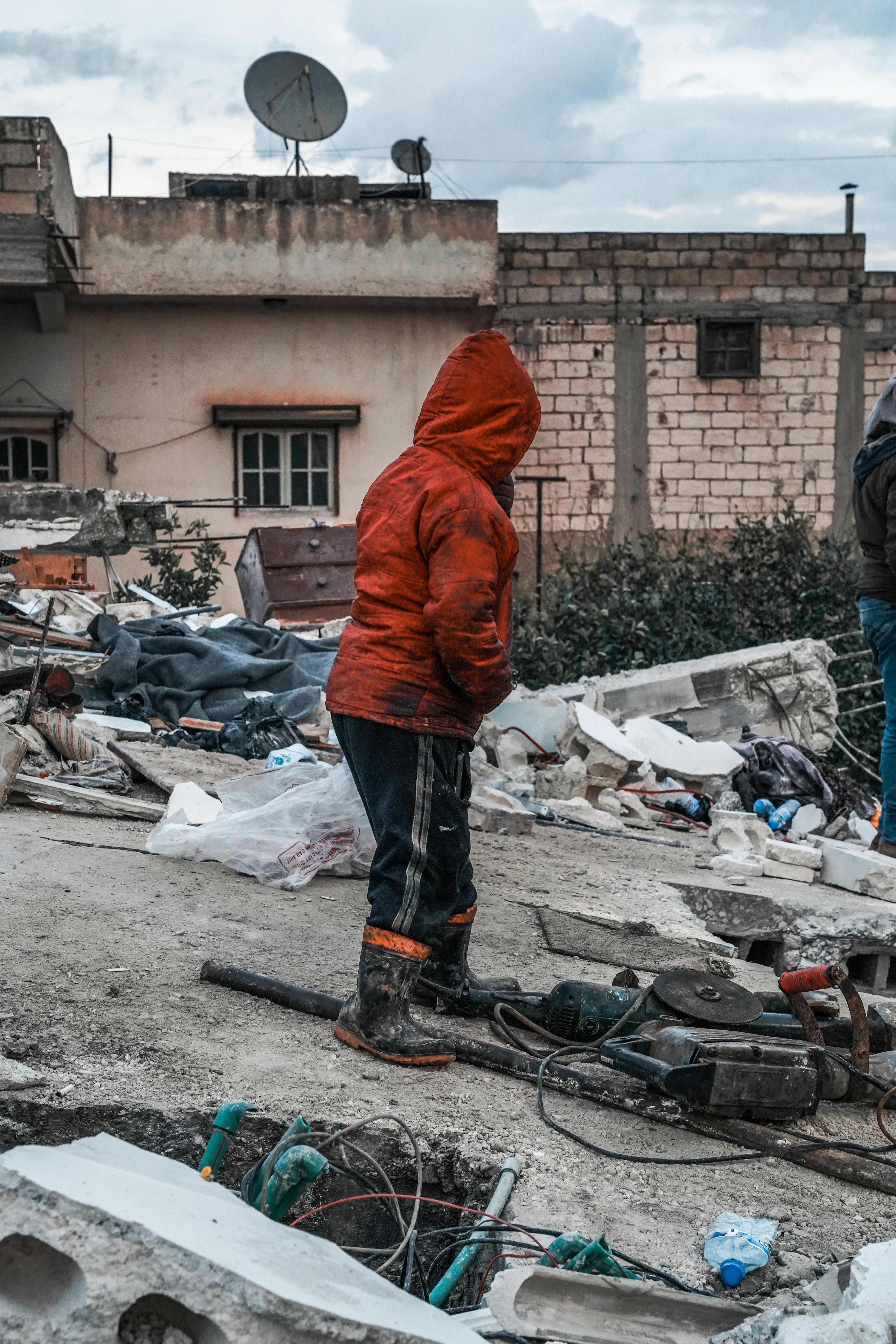 Man Walking on Demolished Street · Free Stock Photo