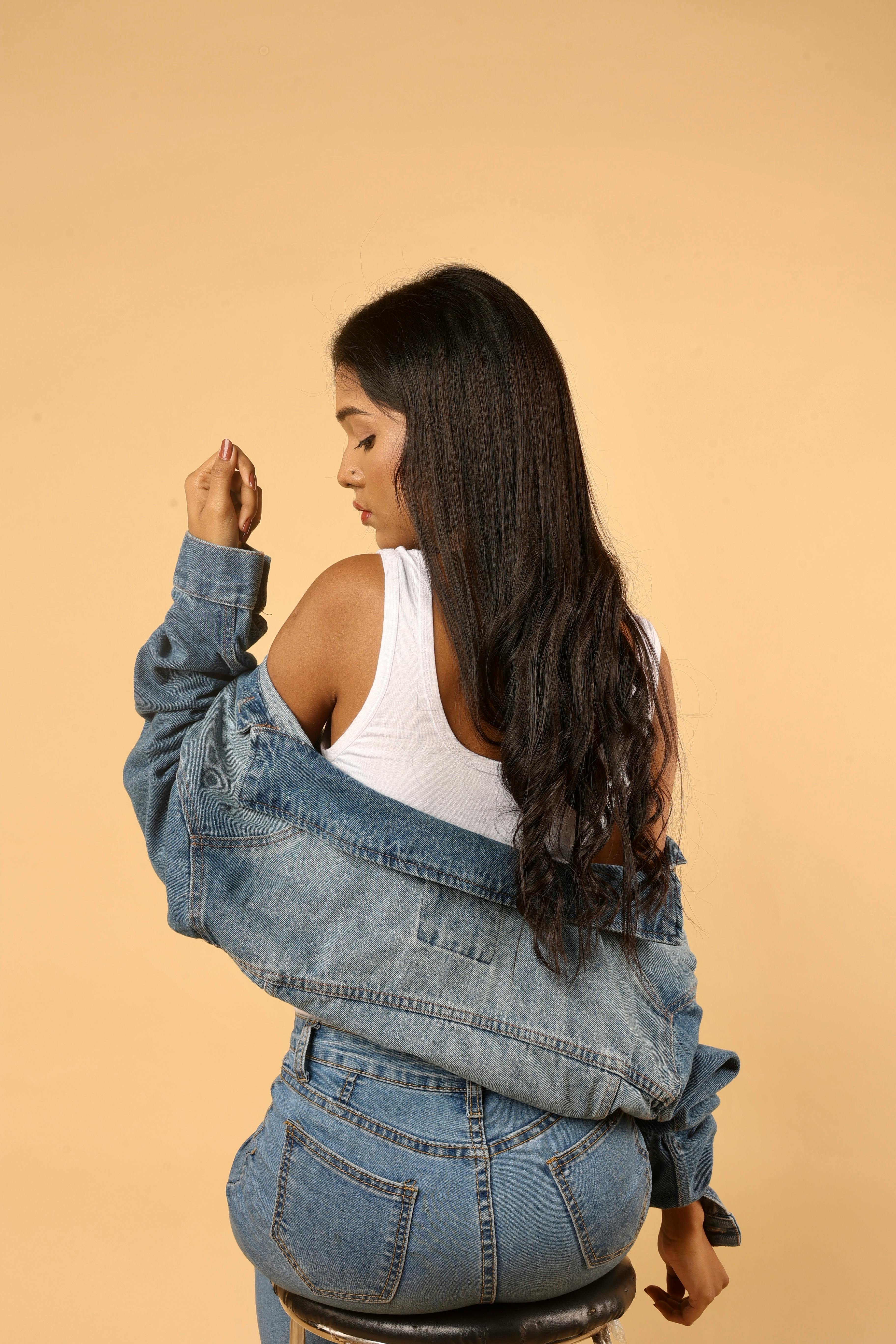 Back View of a Young Woman in a Denim Outfit · Free Stock Photo