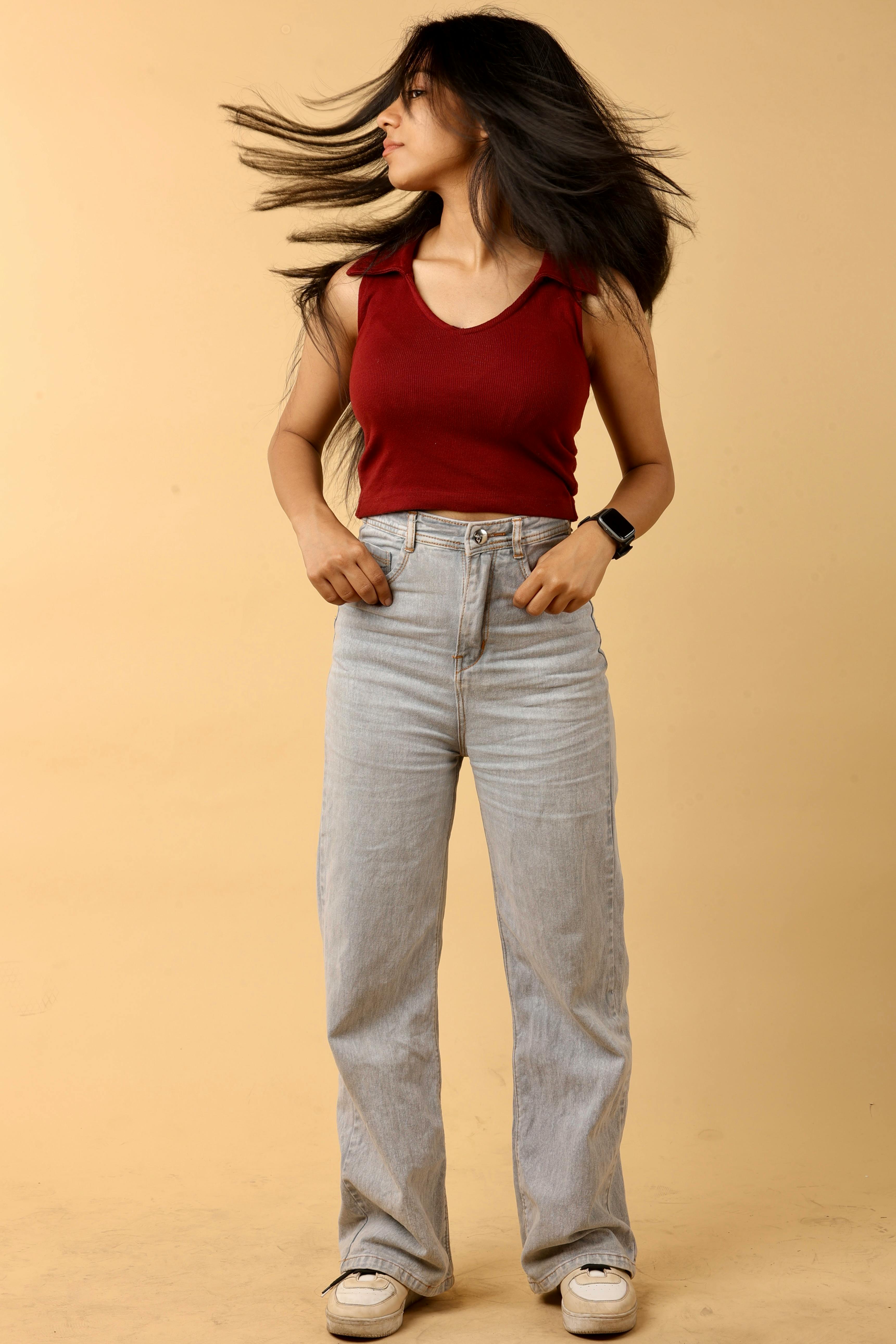 Woman Crouching and Posing · Free Stock Photo