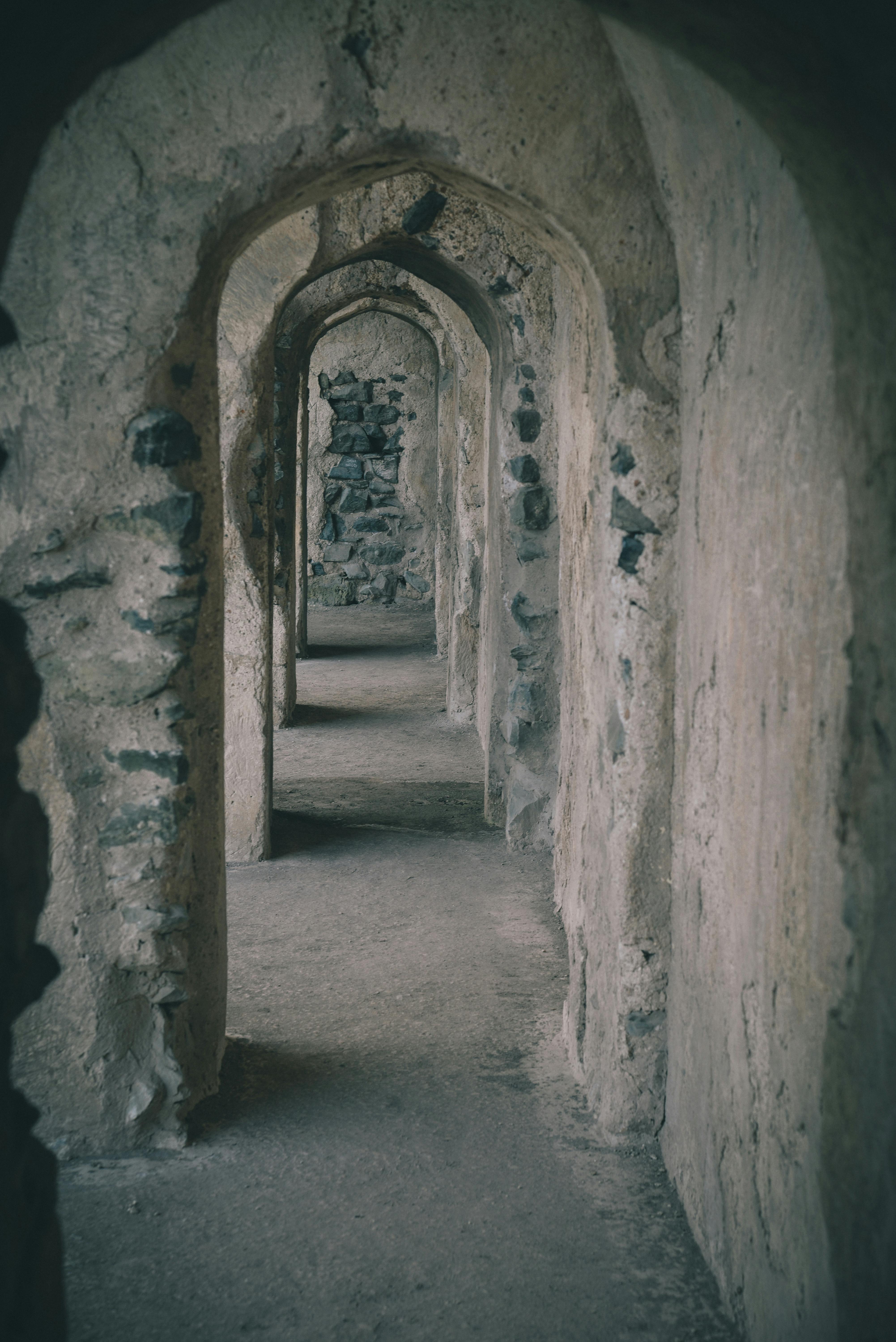 Narrow, Stone Corridor · Free Stock Photo
