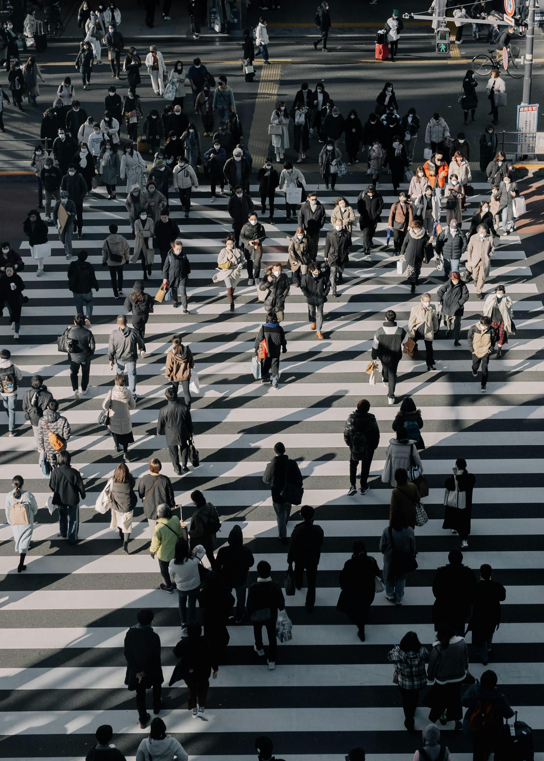 People Crossing On Pedestrian Lane · Free Stock Photo