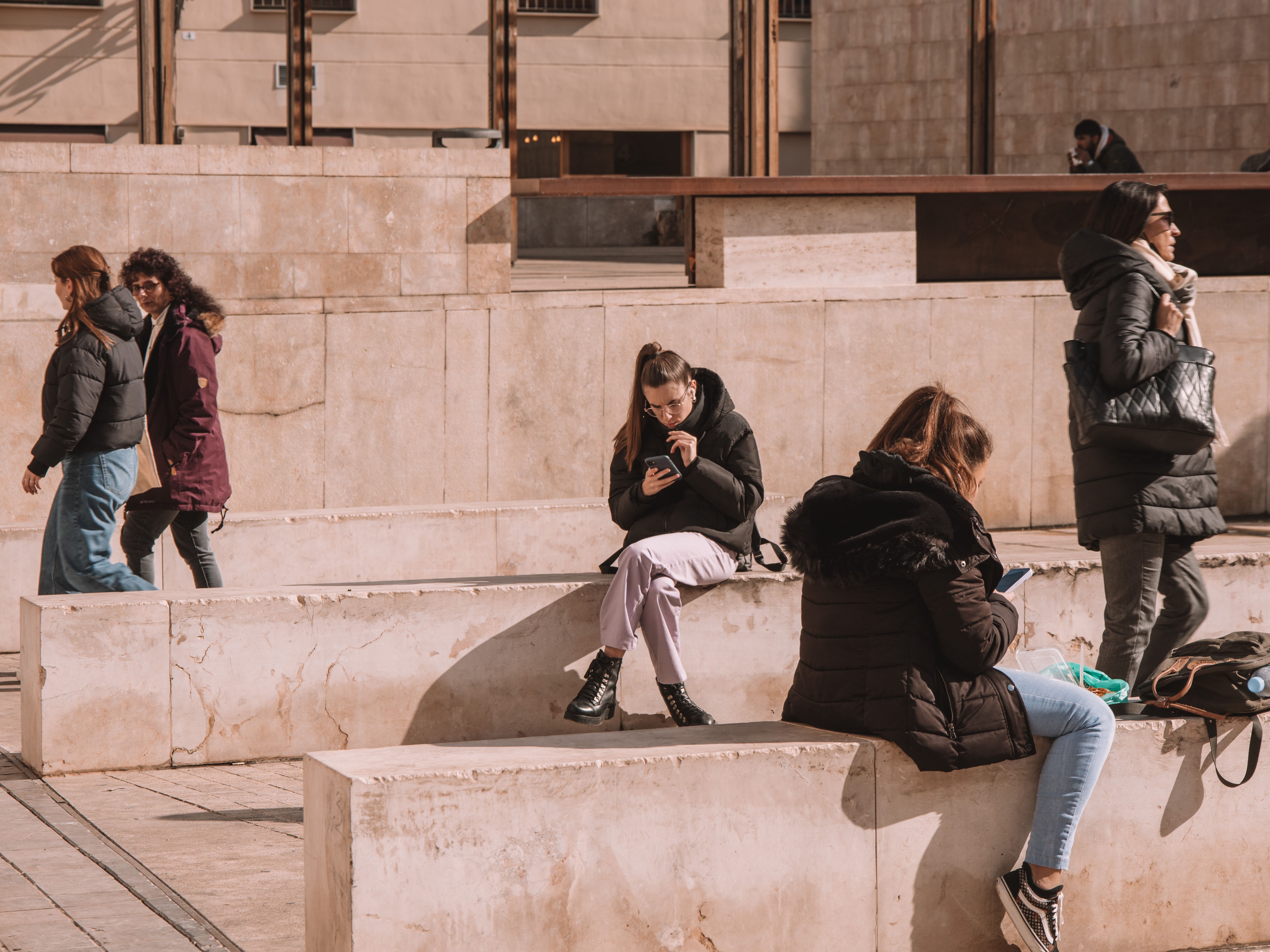 People Sitting on Walls · Free Stock Photo