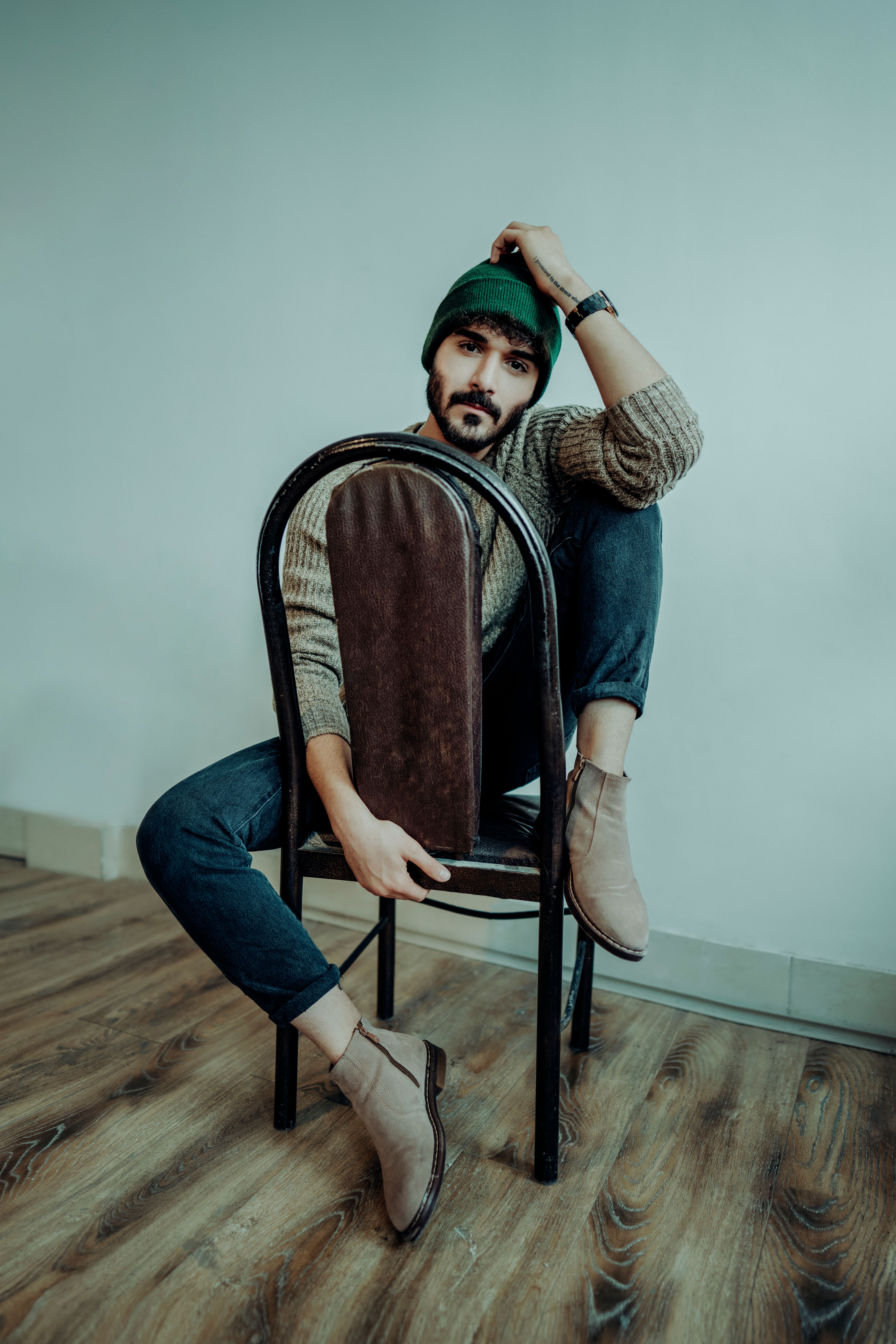 Man Sitting on Chair and Posing · Free Stock Photo