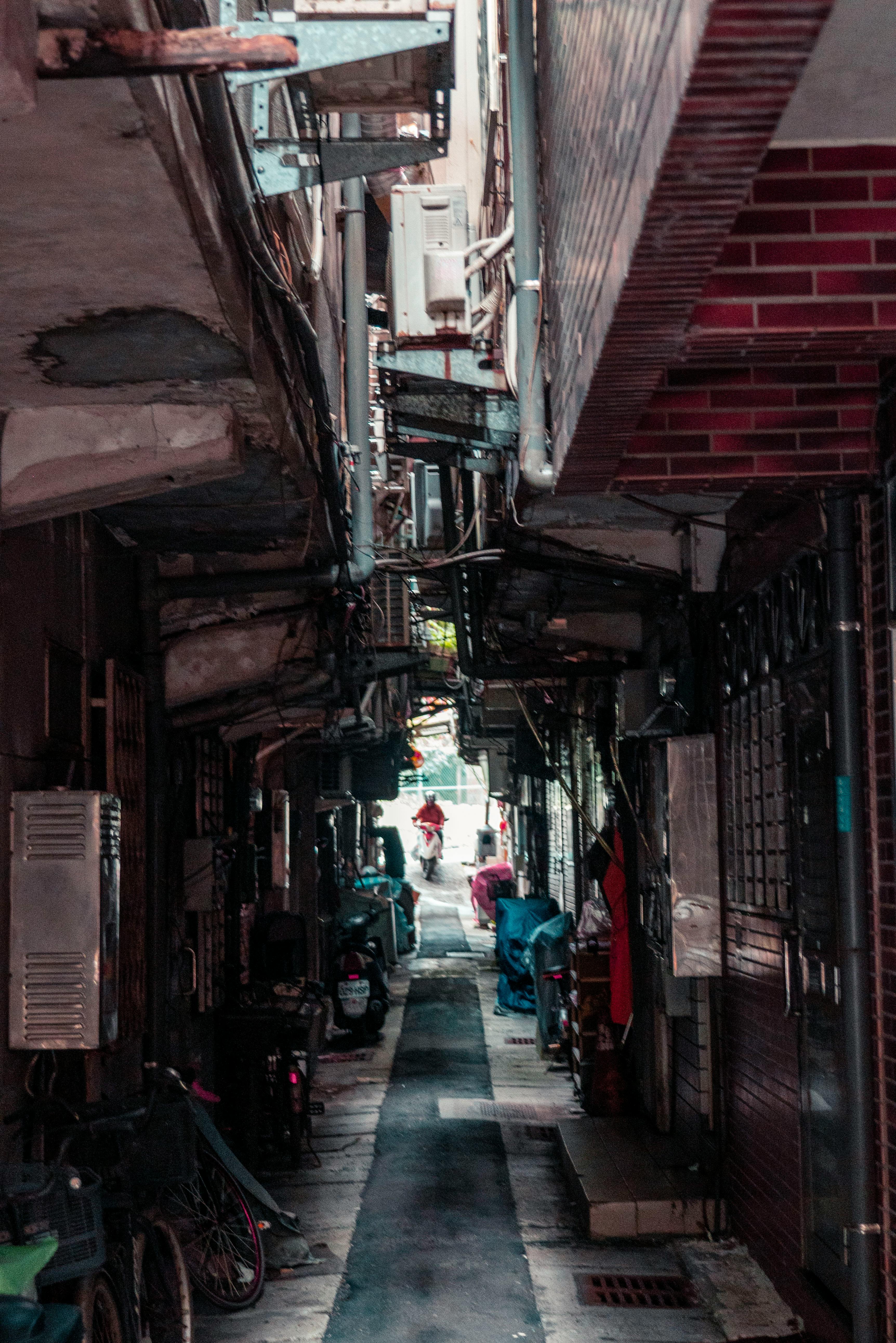 A Narrow Street between Buildings · Free Stock Photo