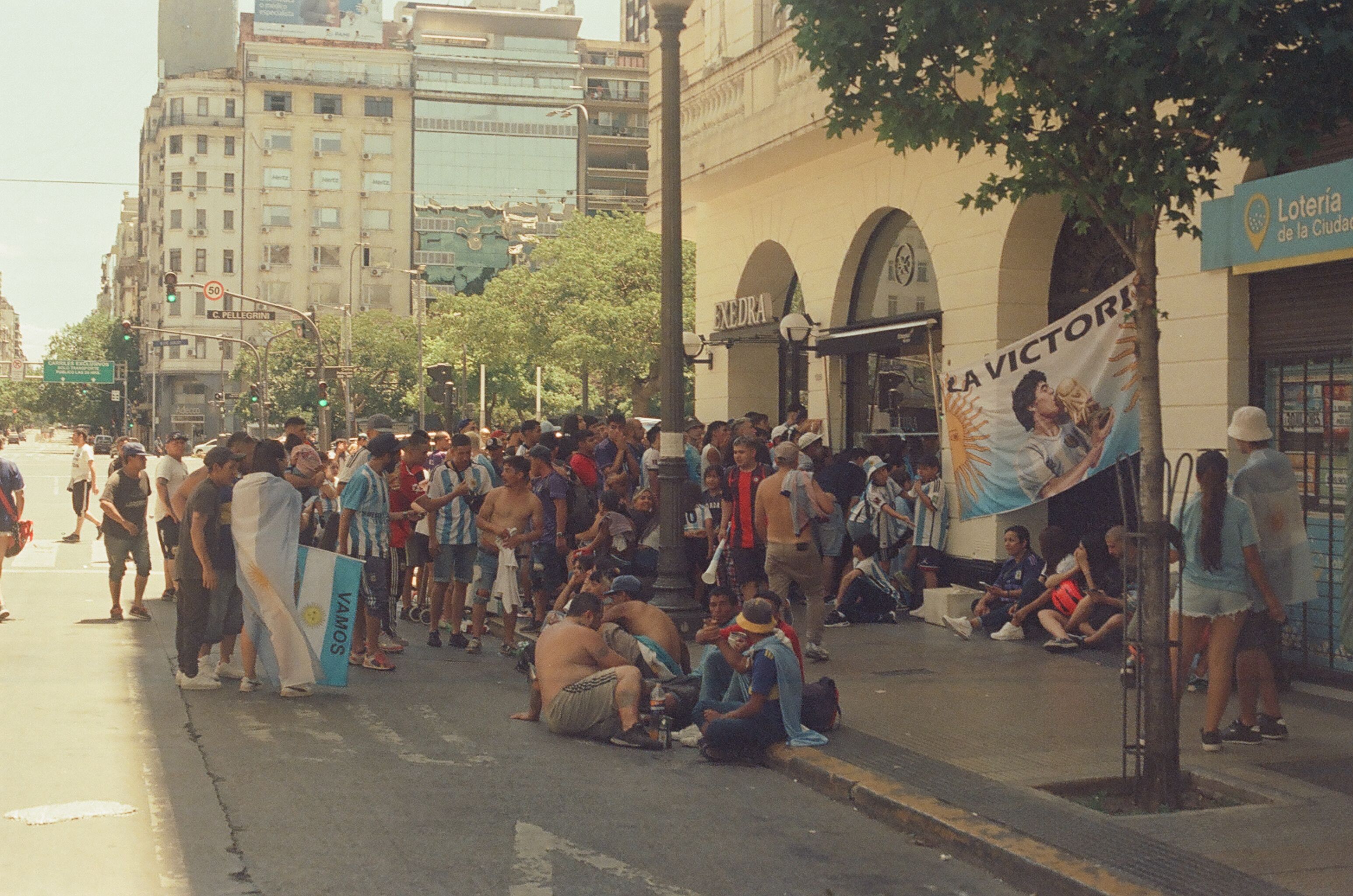 Crowd on City Street Between Buildings · Free Stock Photo