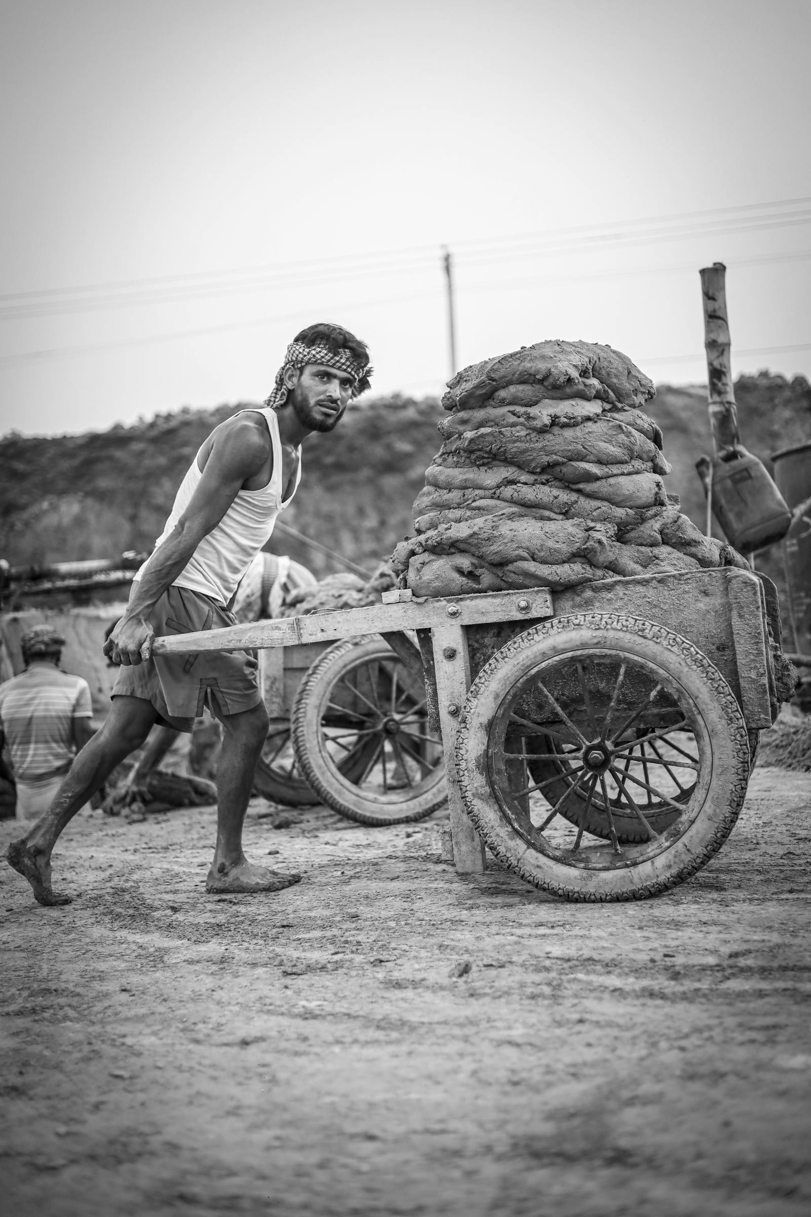 Man Pushing Cart Square Wheels Photos, Download The BEST Free Man ...