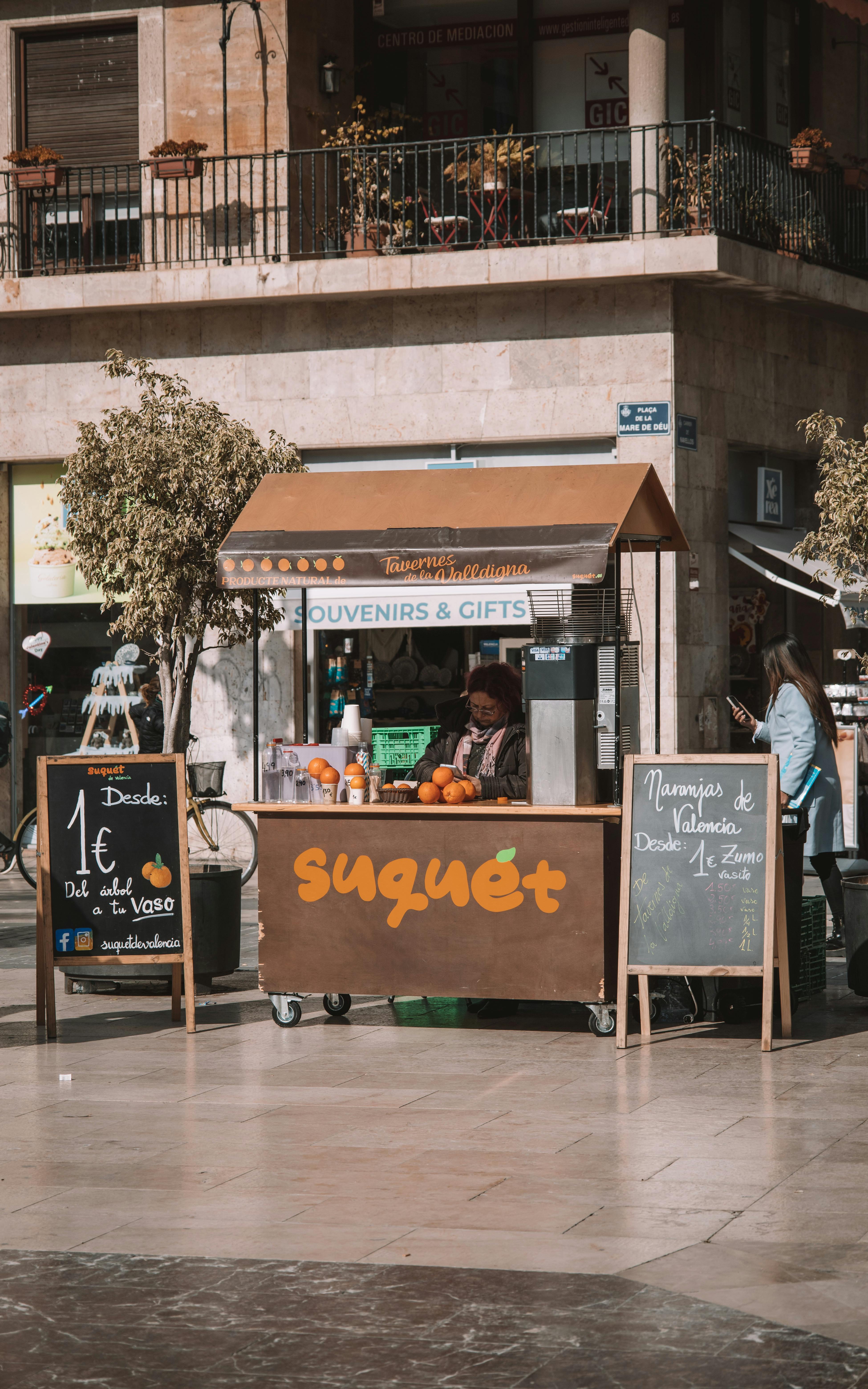 Street Food Booth on Town Square · Free Stock Photo