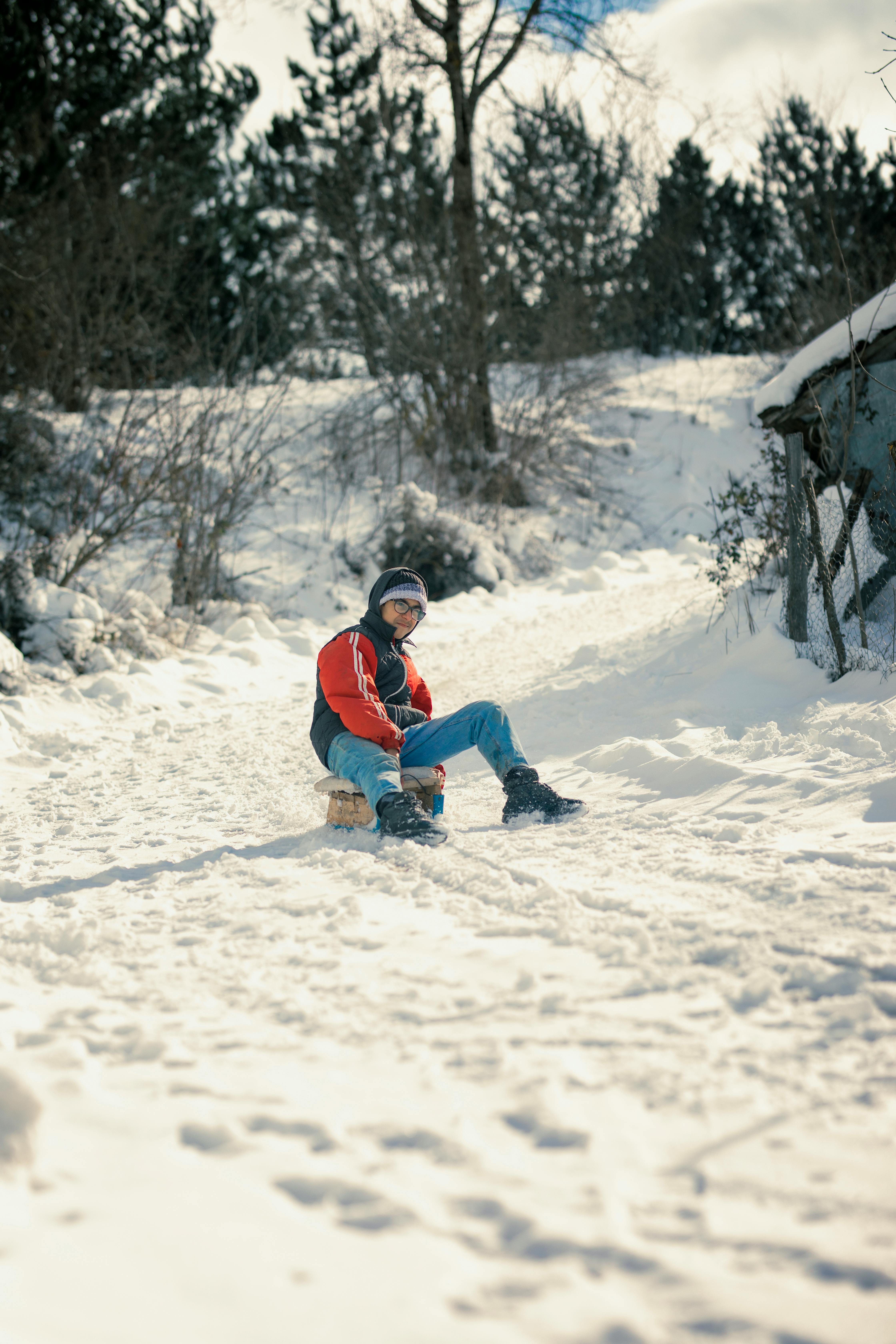 Sliding Down the Slope of a Snow-covered Hill · Free Stock Photo