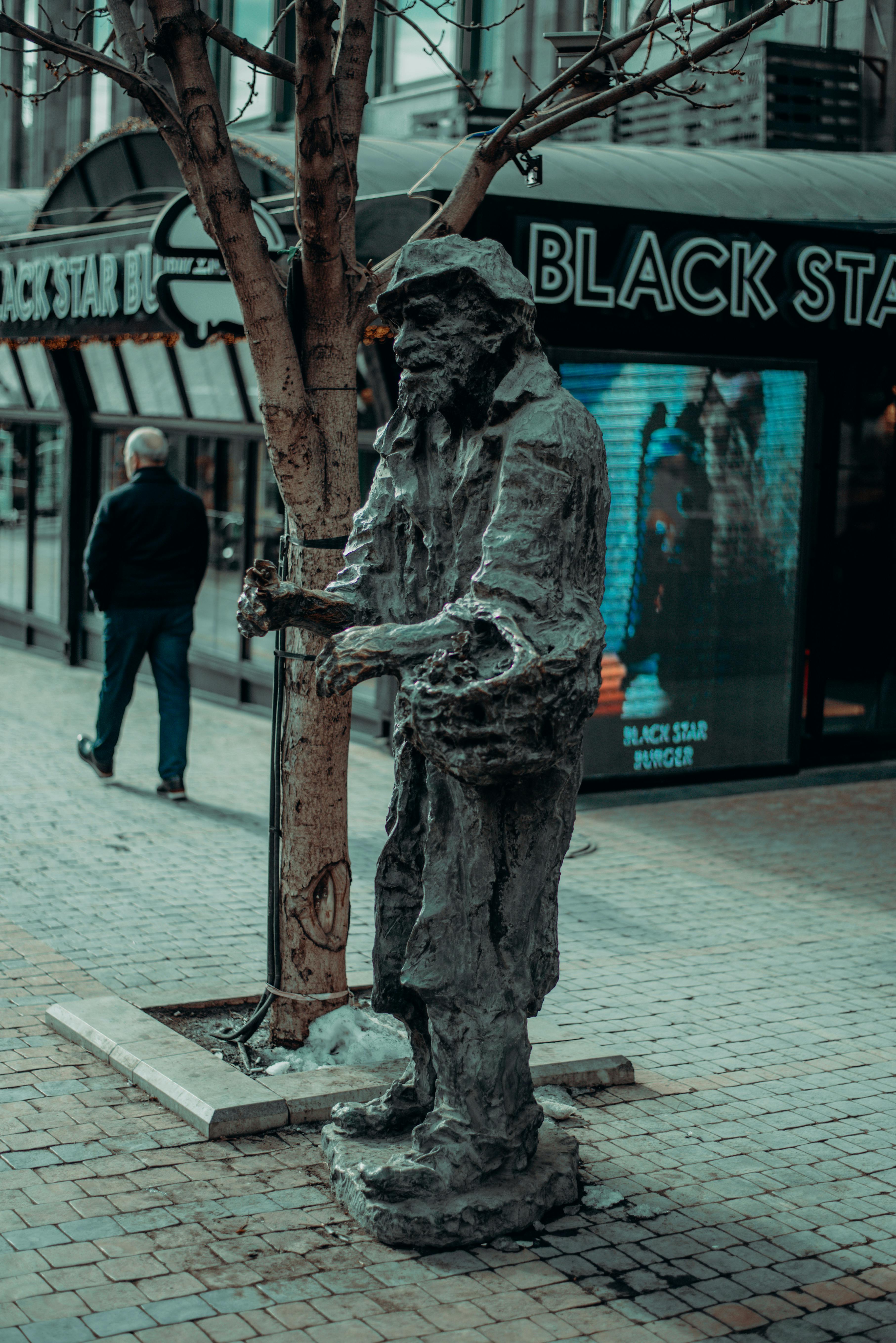 Statue of Elderly Standing Man · Free Stock Photo