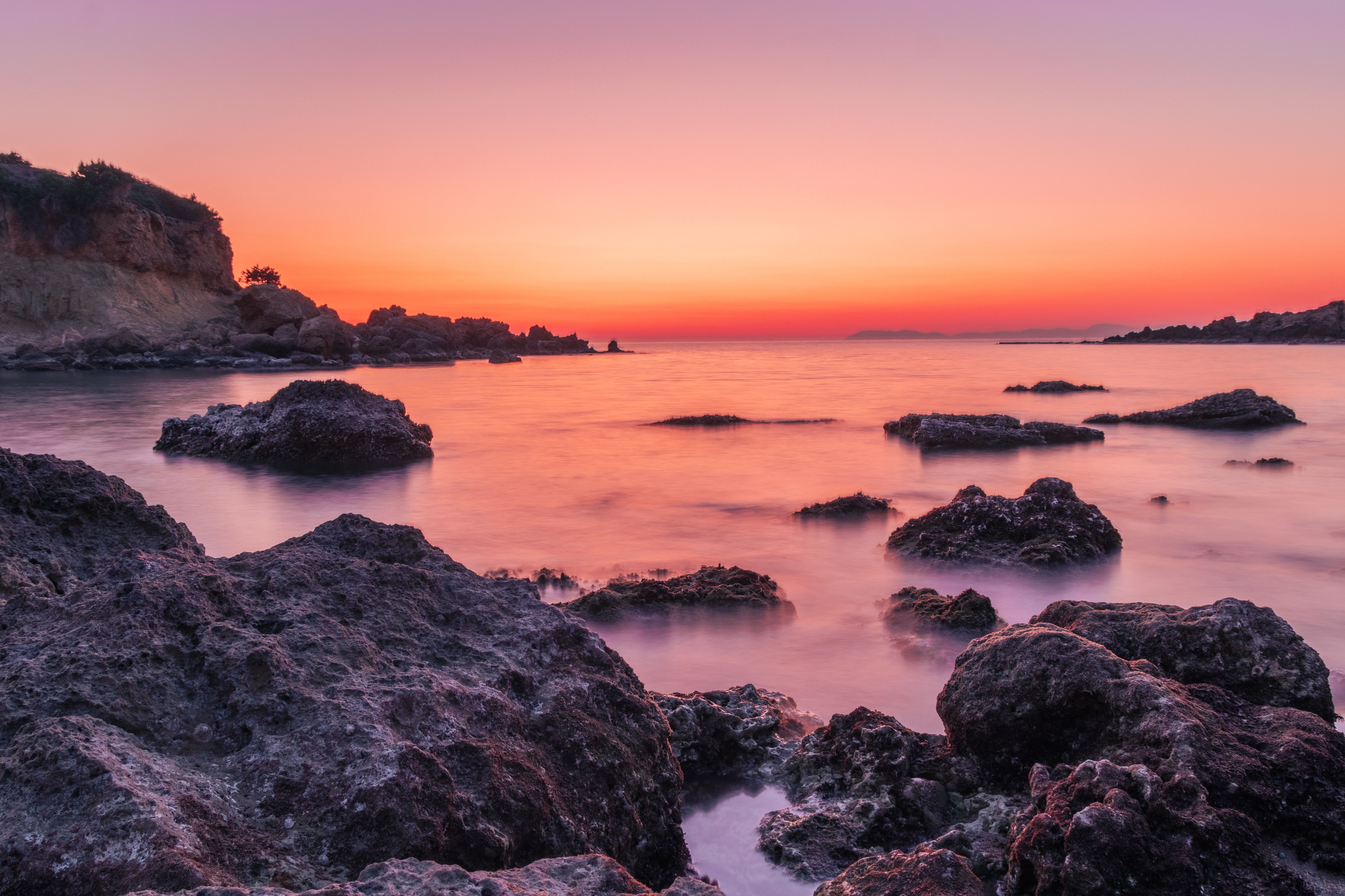 Rocks on Sea Shore at Sunset · Free Stock Photo