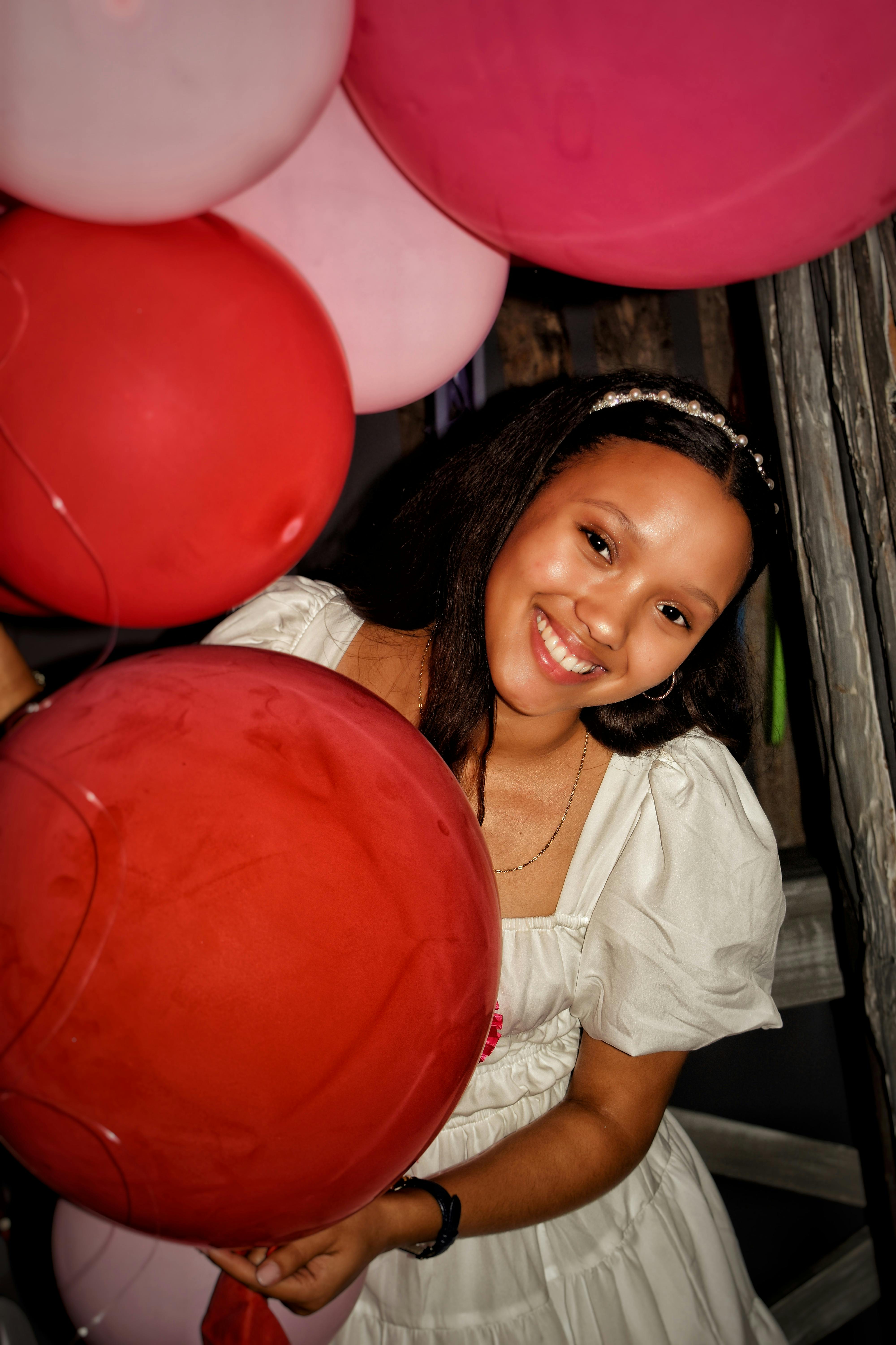 Woman Cheering and Holding Her Arm Up · Free Stock Photo