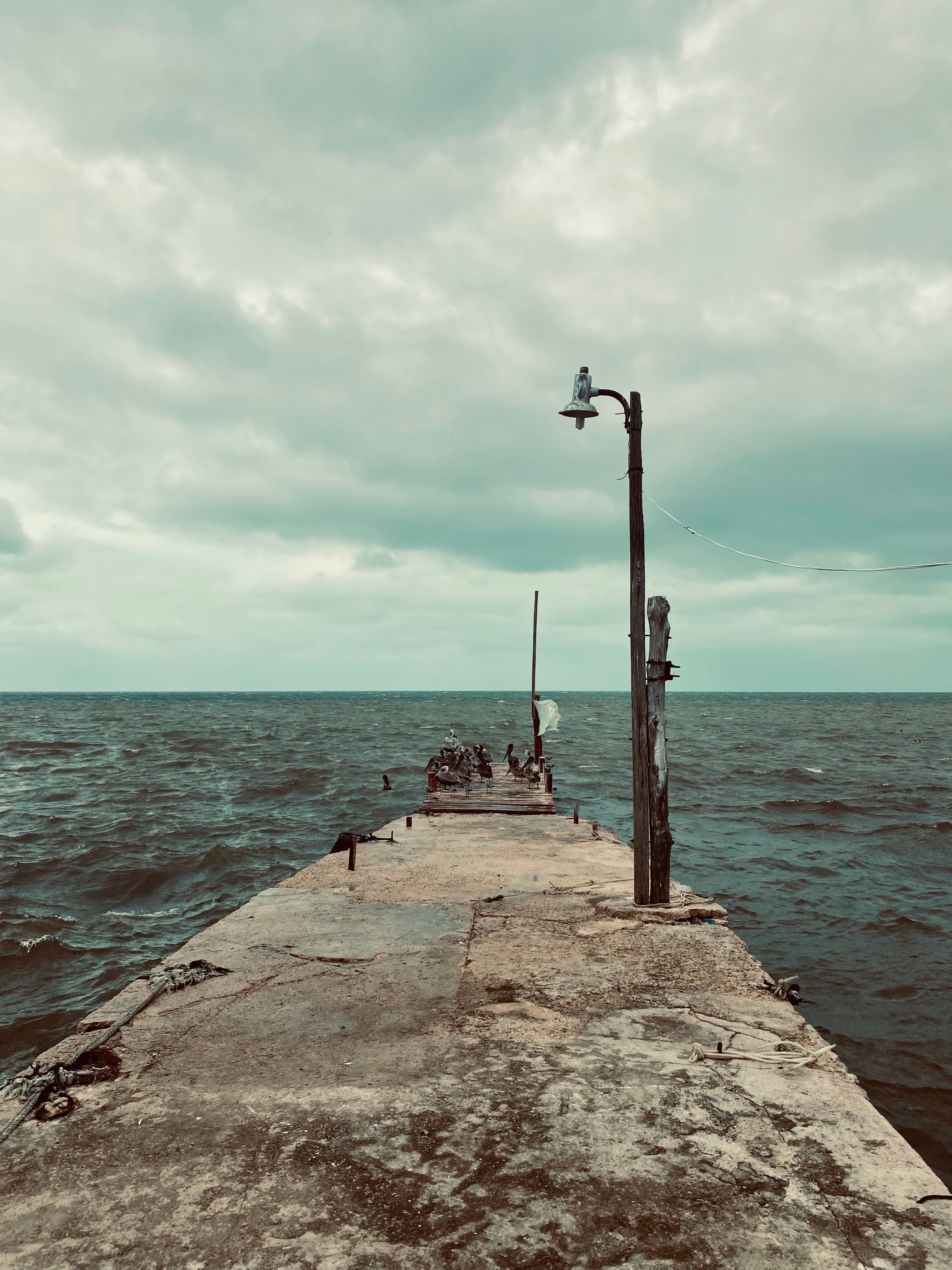 Stone Pier on Sea Shore · Free Stock Photo