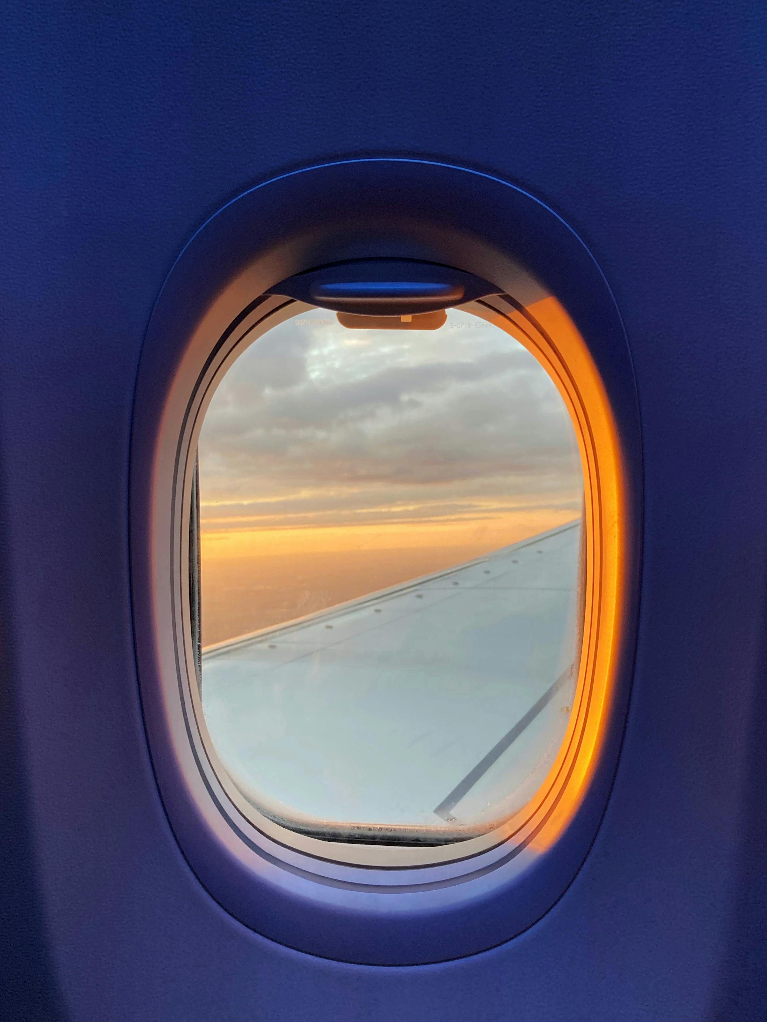 White Commercial Plane Window · Free Stock Photo