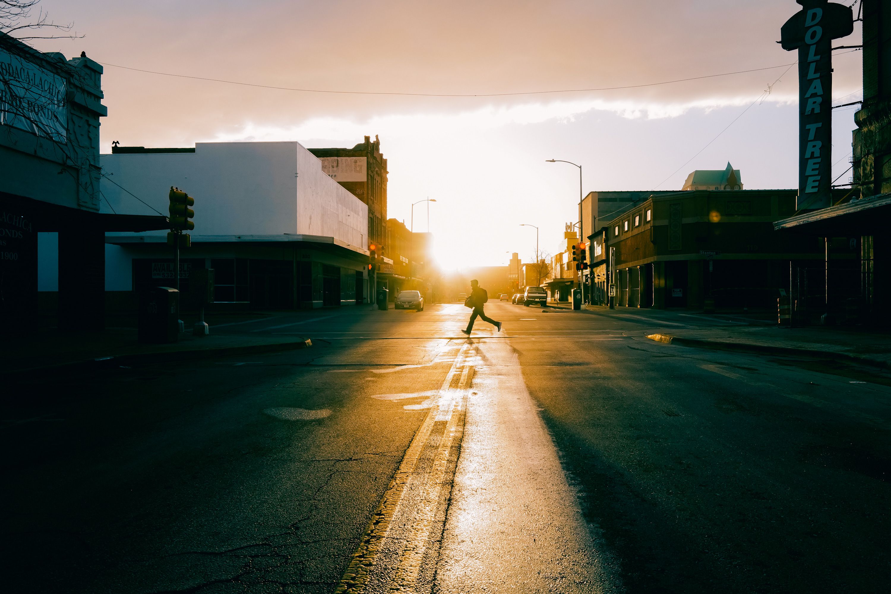 Silhouette of a Man Standing Beside the Building · Free Stock Photo