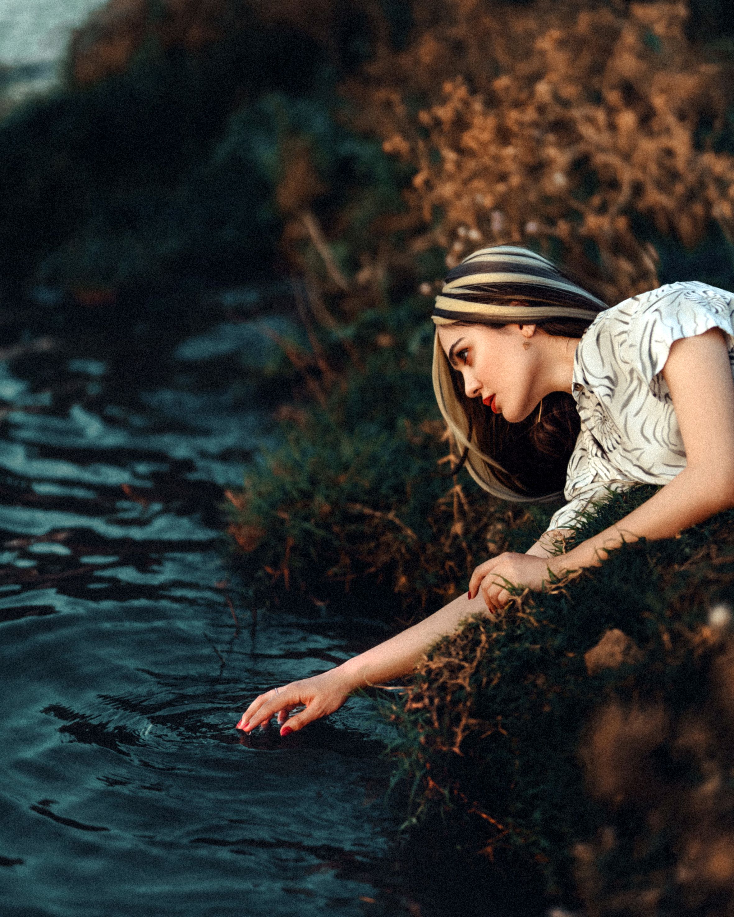 Woman Touching Water · Free Stock Photo