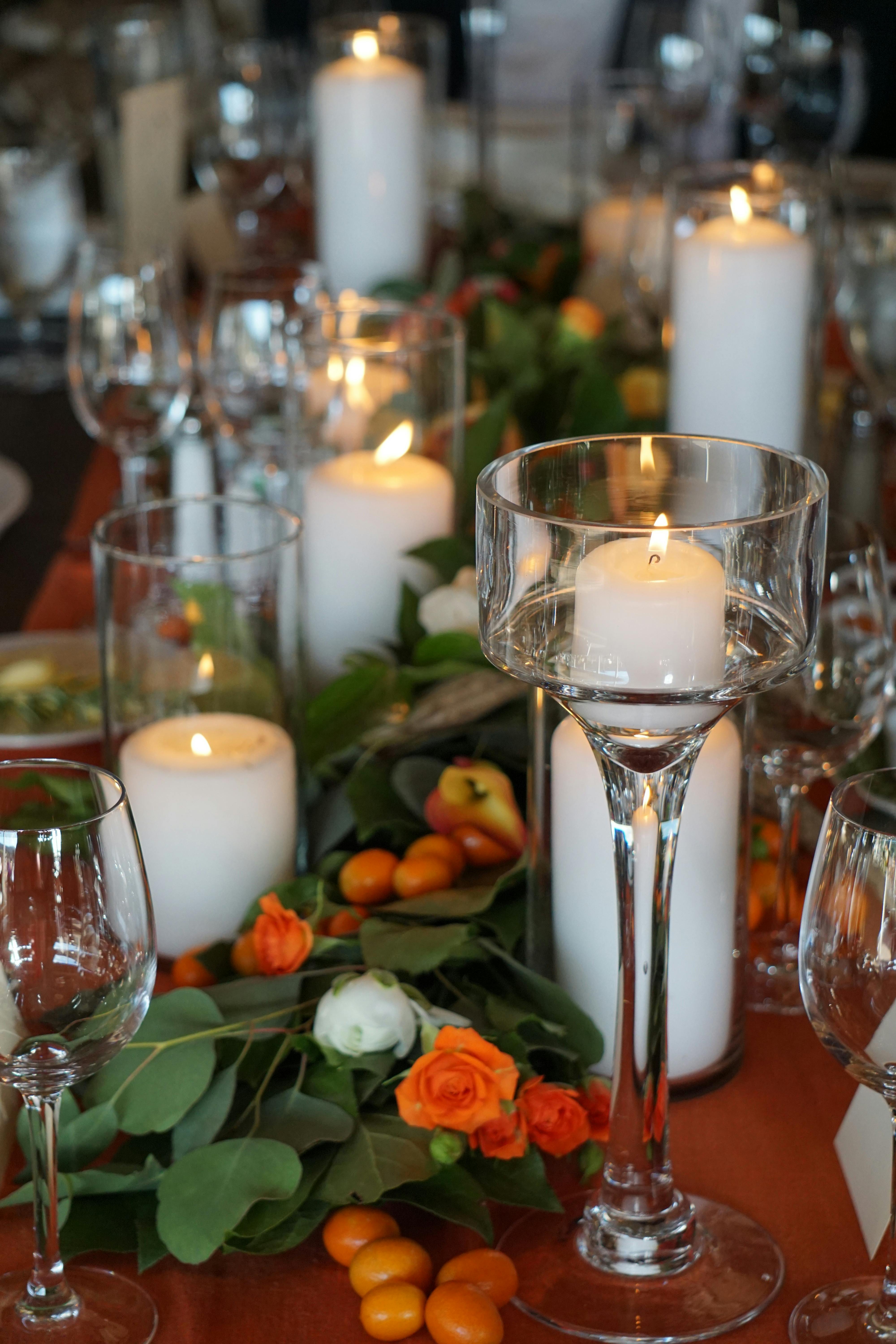 Glassware and Candles on a Table · Free Stock Photo