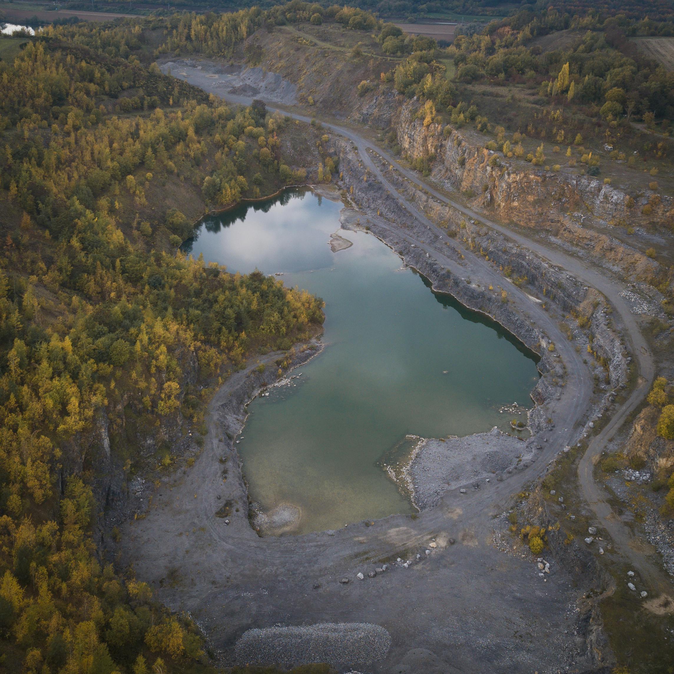 Top View Of Lake Surrounded By Trees · Free Stock Photo
