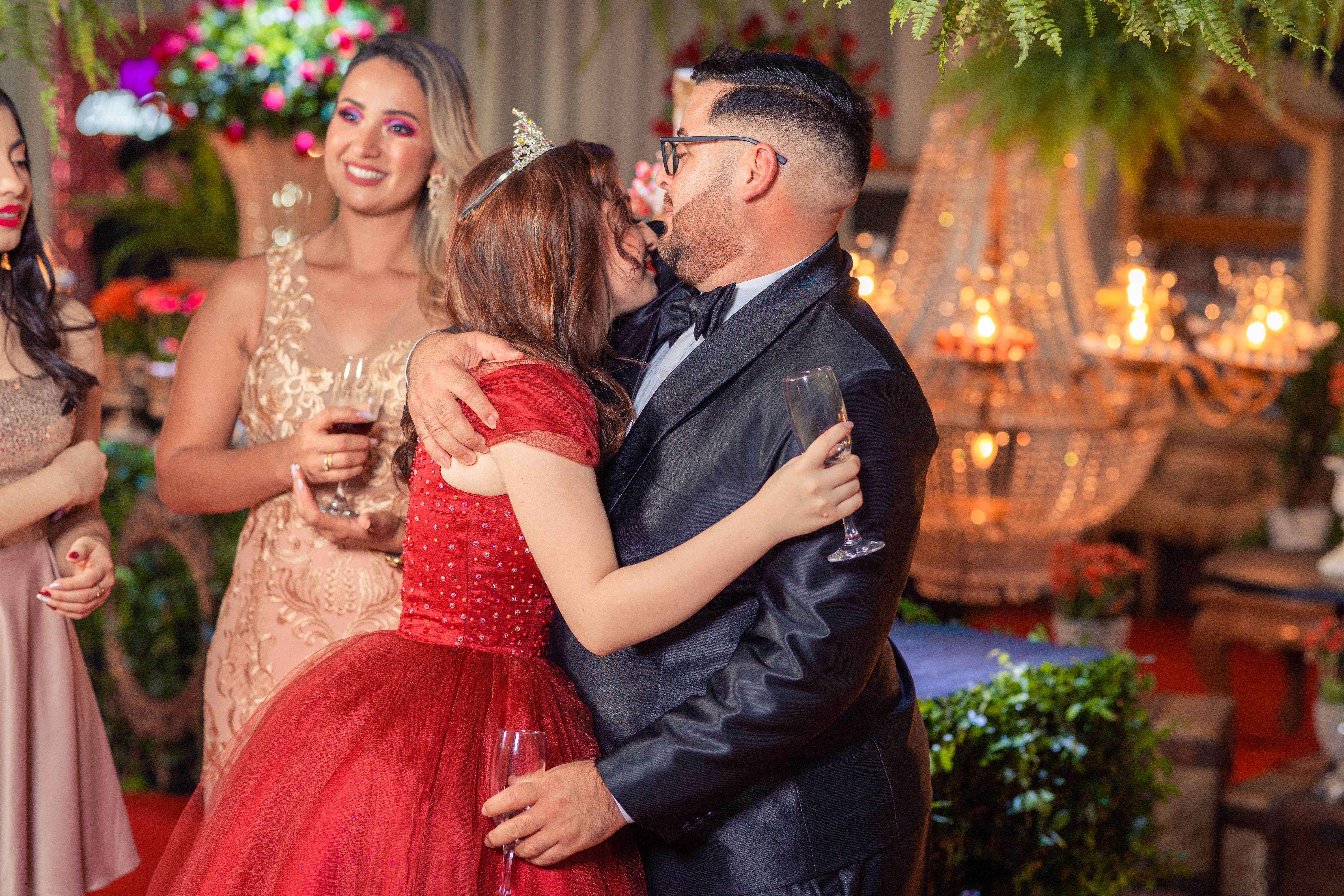People in Elegant Clothes Hugging on a Party · Free Stock Photo