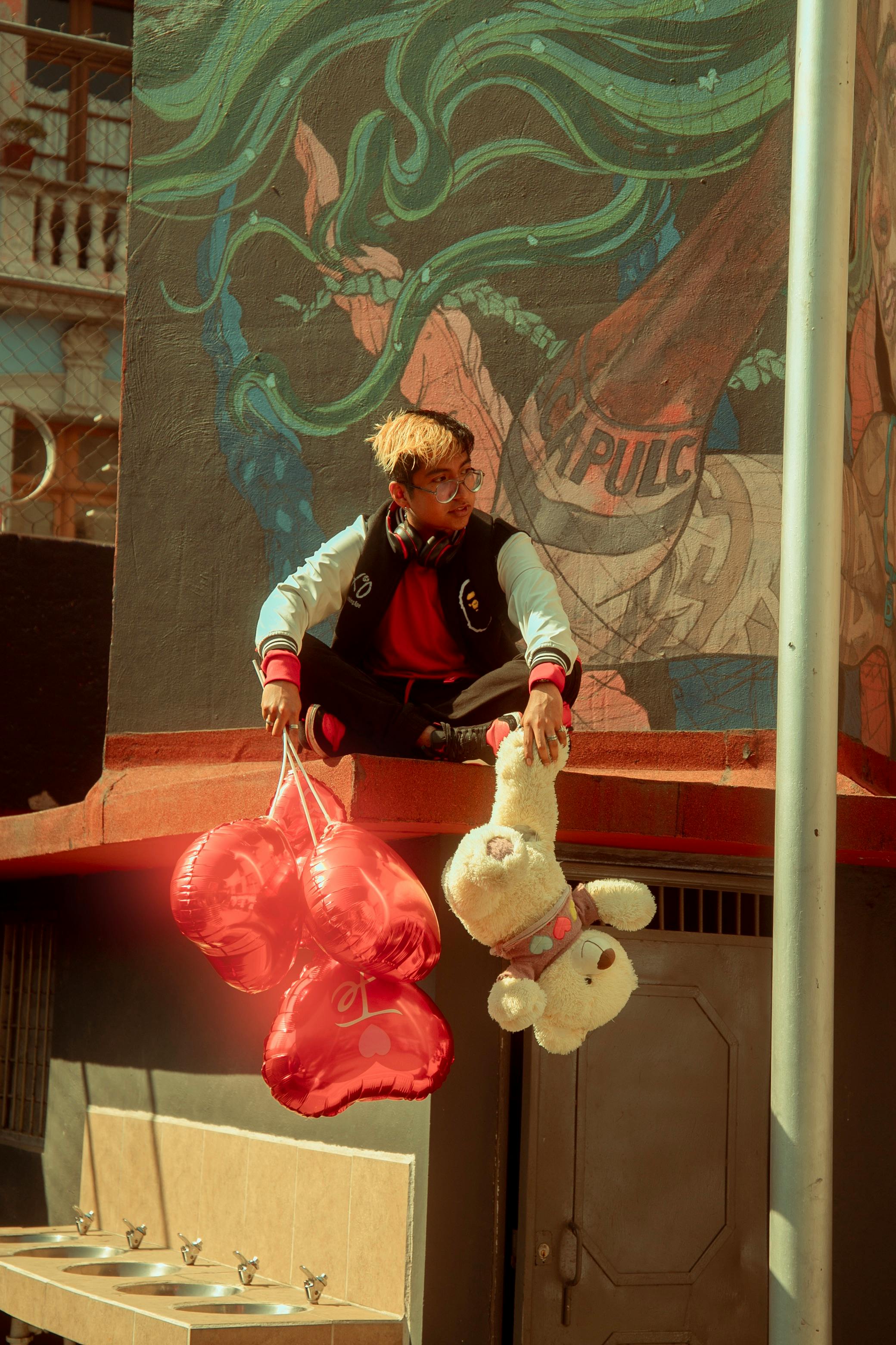 Blue Teddy Beat Mascot on Street · Free Stock Photo