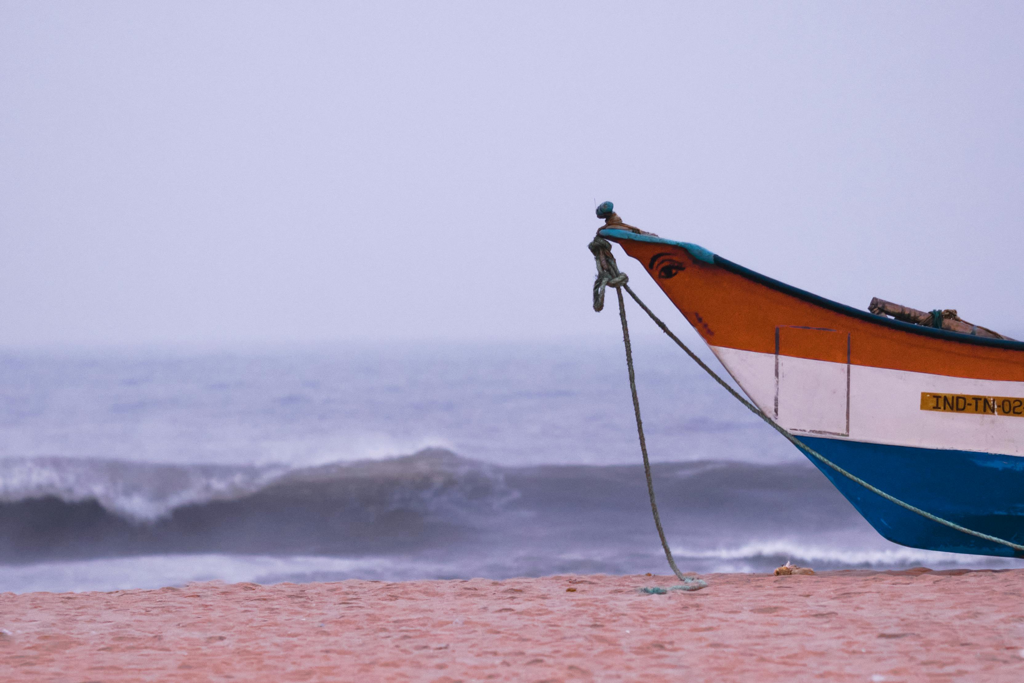 Wave behind Boat on Beach · Free Stock Photo