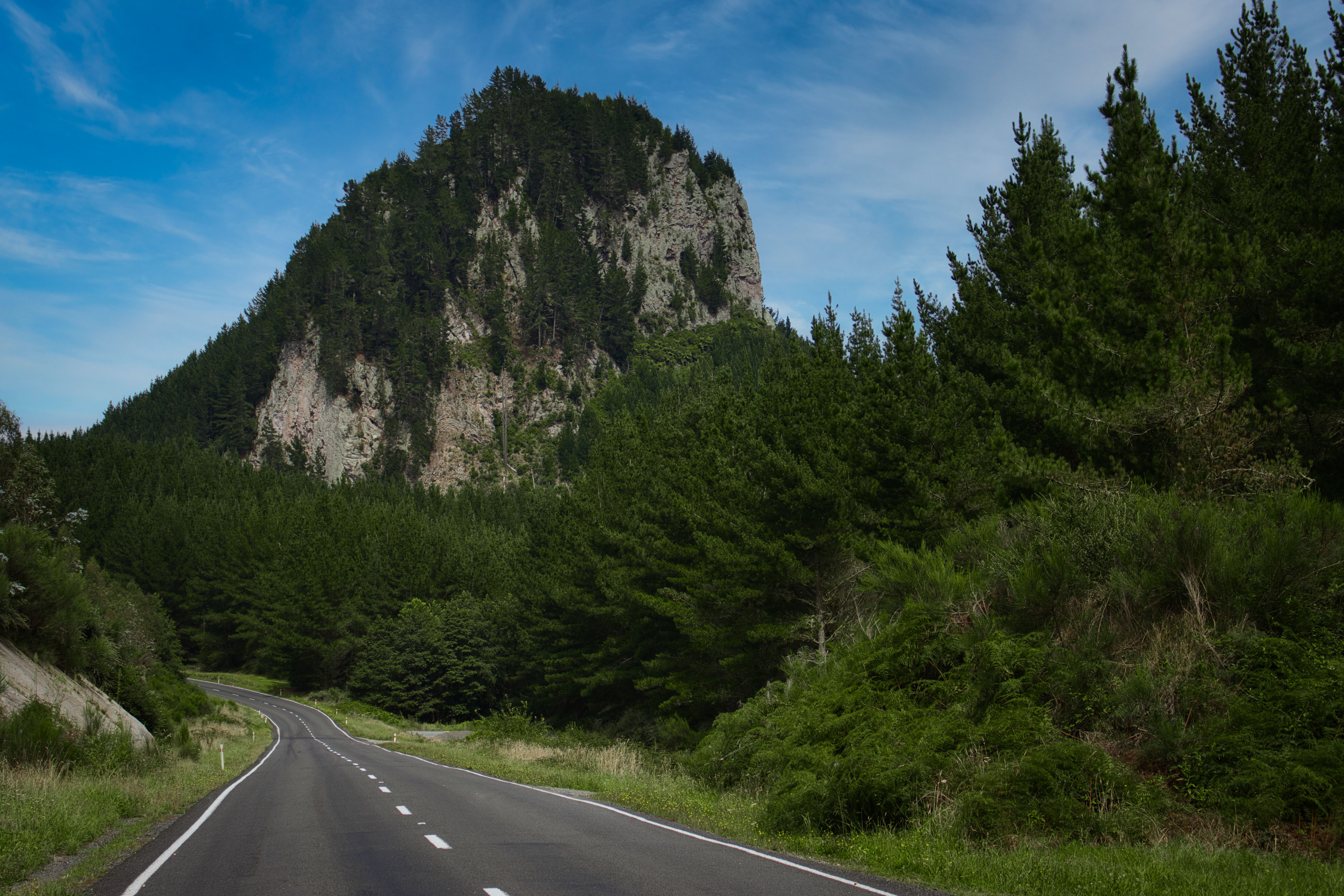 Empty Road with Hill behind · Free Stock Photo