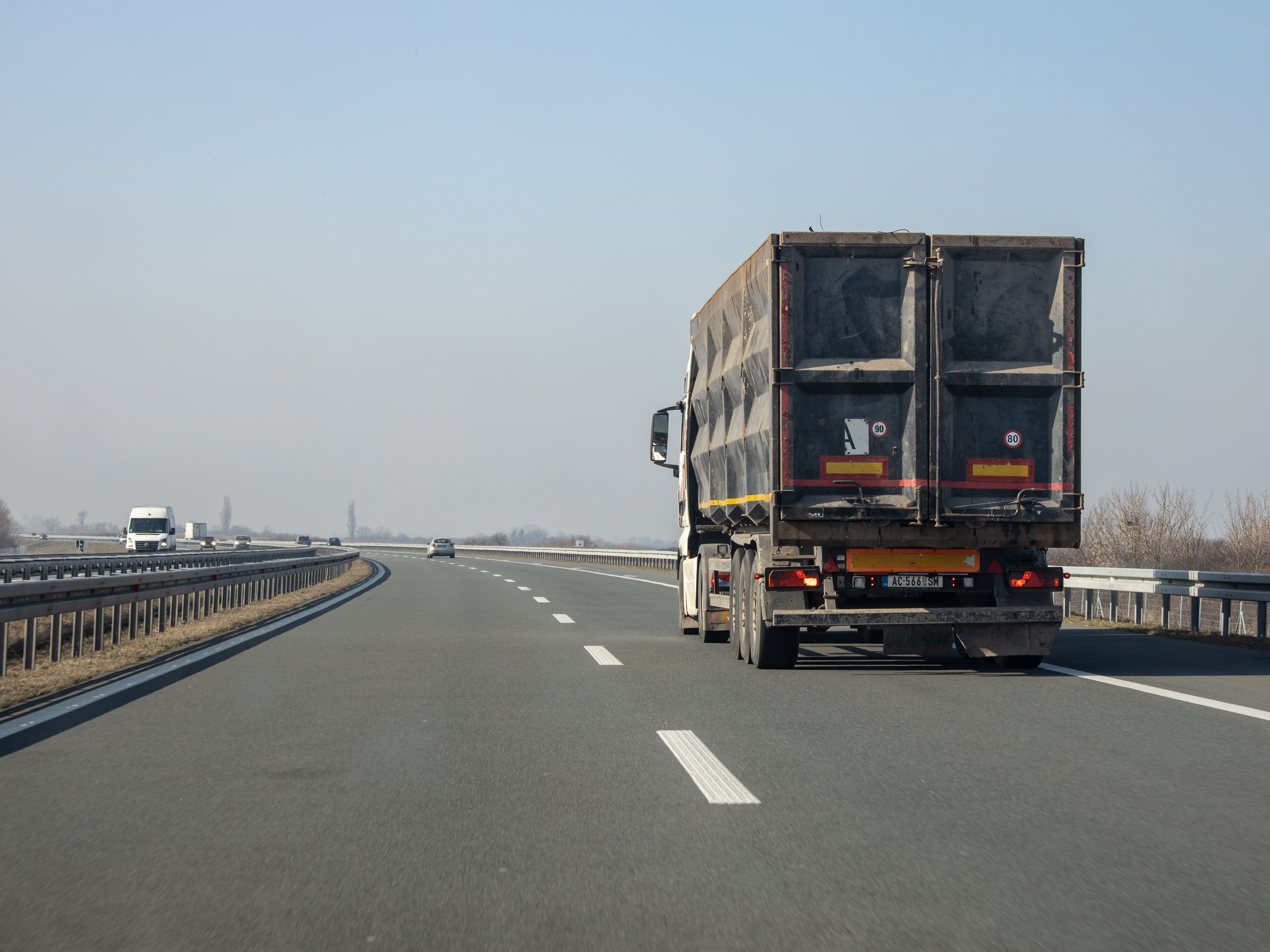 A Truck on an Expressway · Free Stock Photo