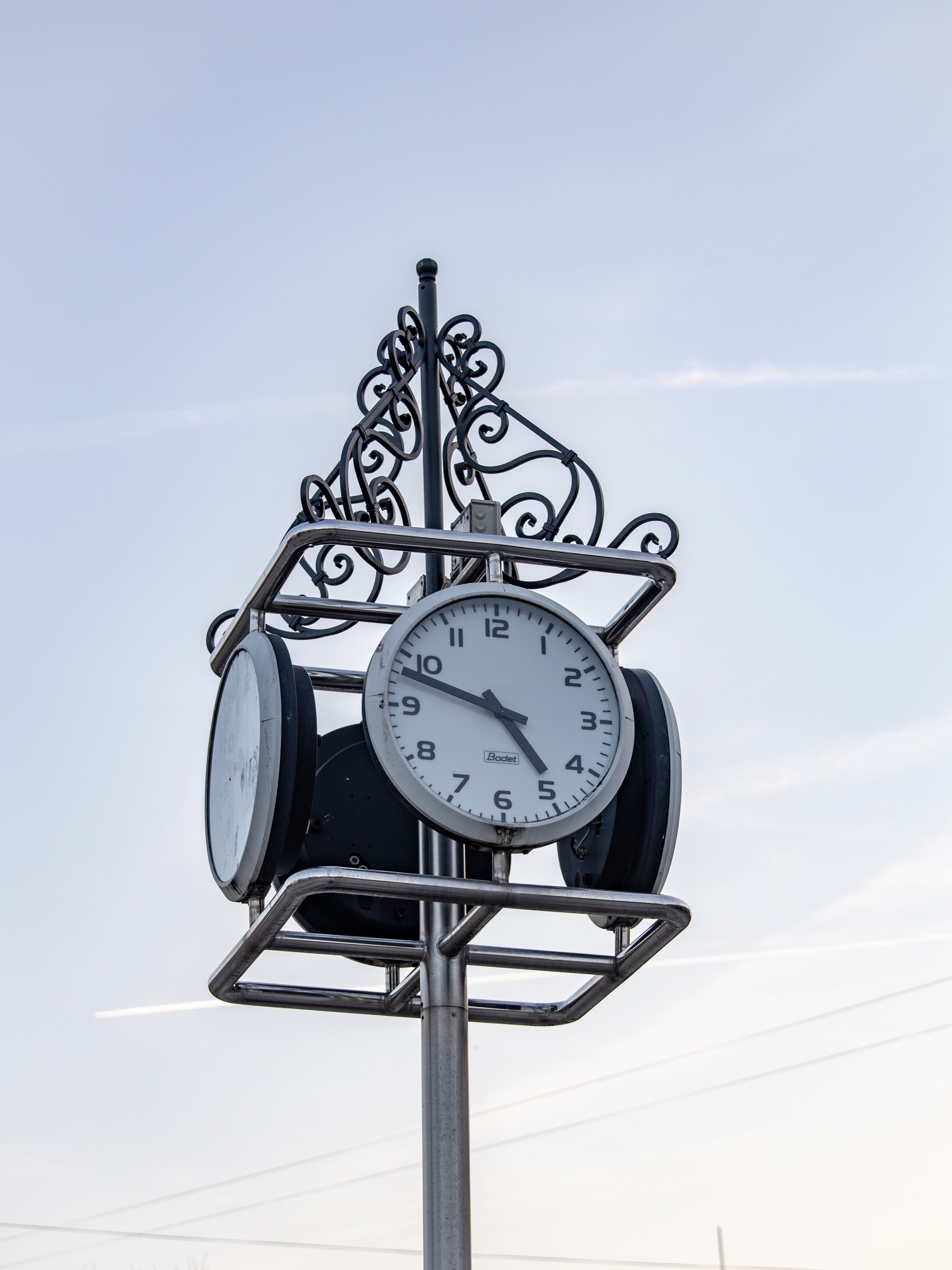 An Antique Clock on a Pole · Free Stock Photo
