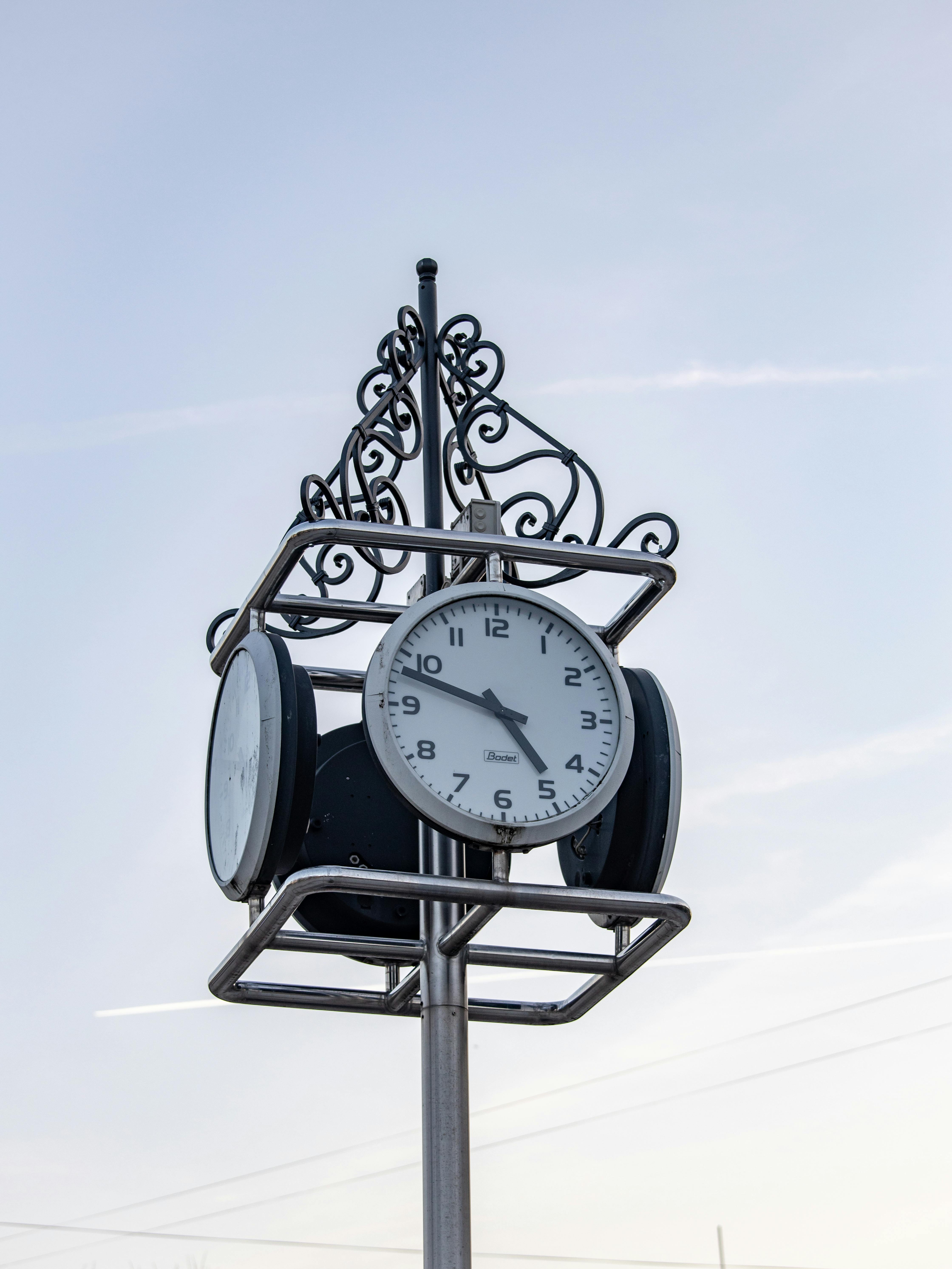 Roman Numeral Round Analog Clock at 4:02 · Free Stock Photo