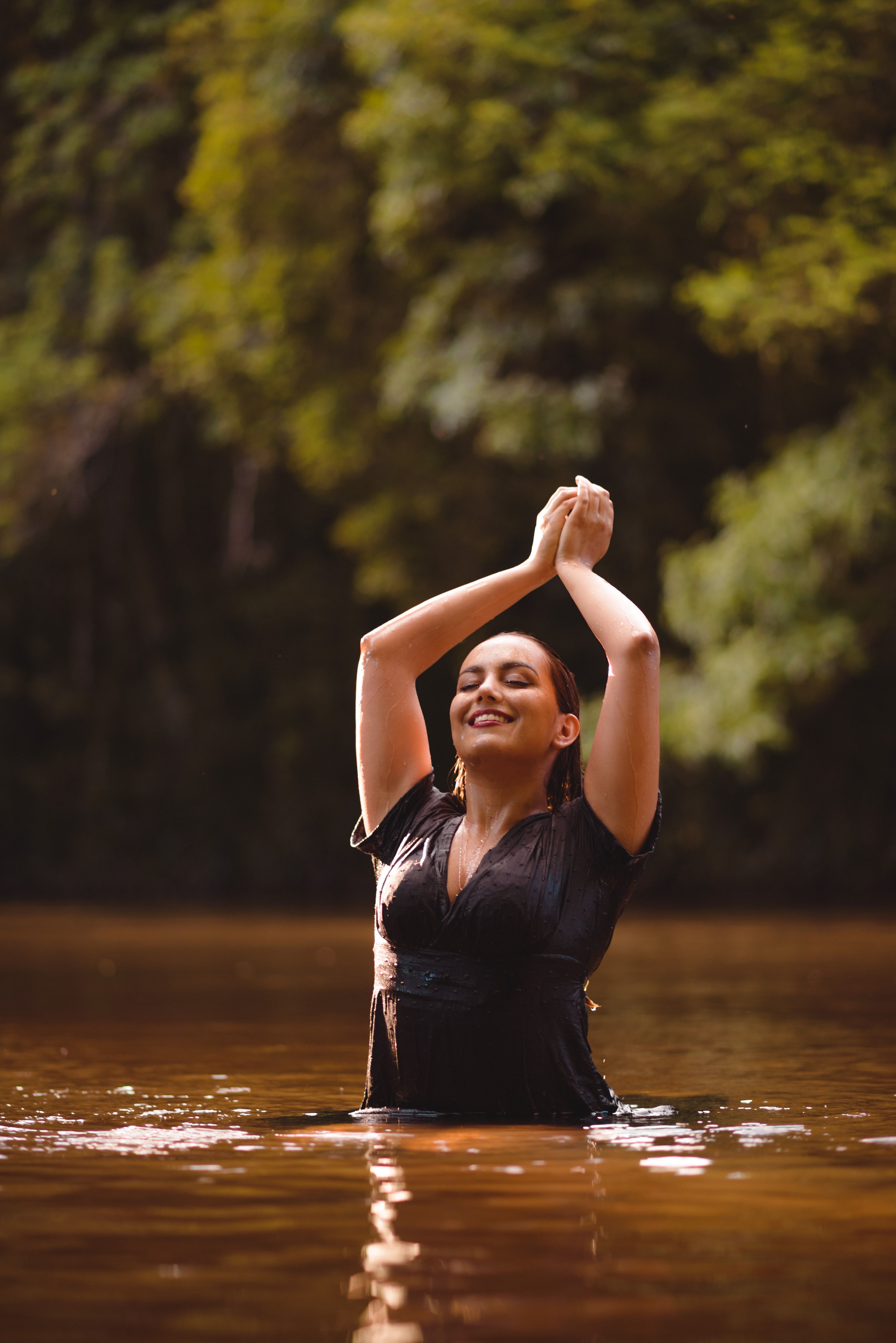 Woman in a Dress Posing in Water · Free Stock Photo