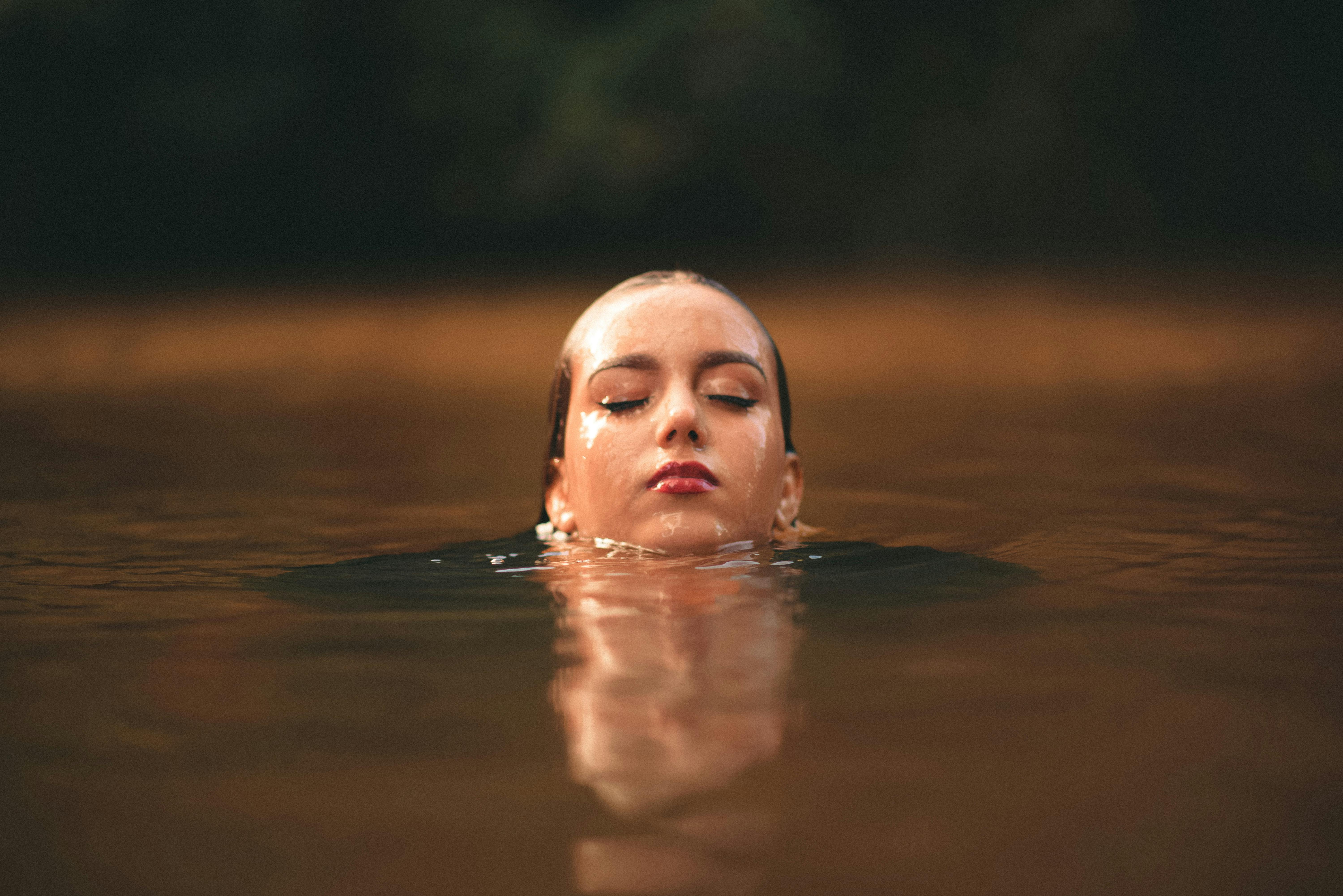 Girl Emerging from the Water · Free Stock Photo