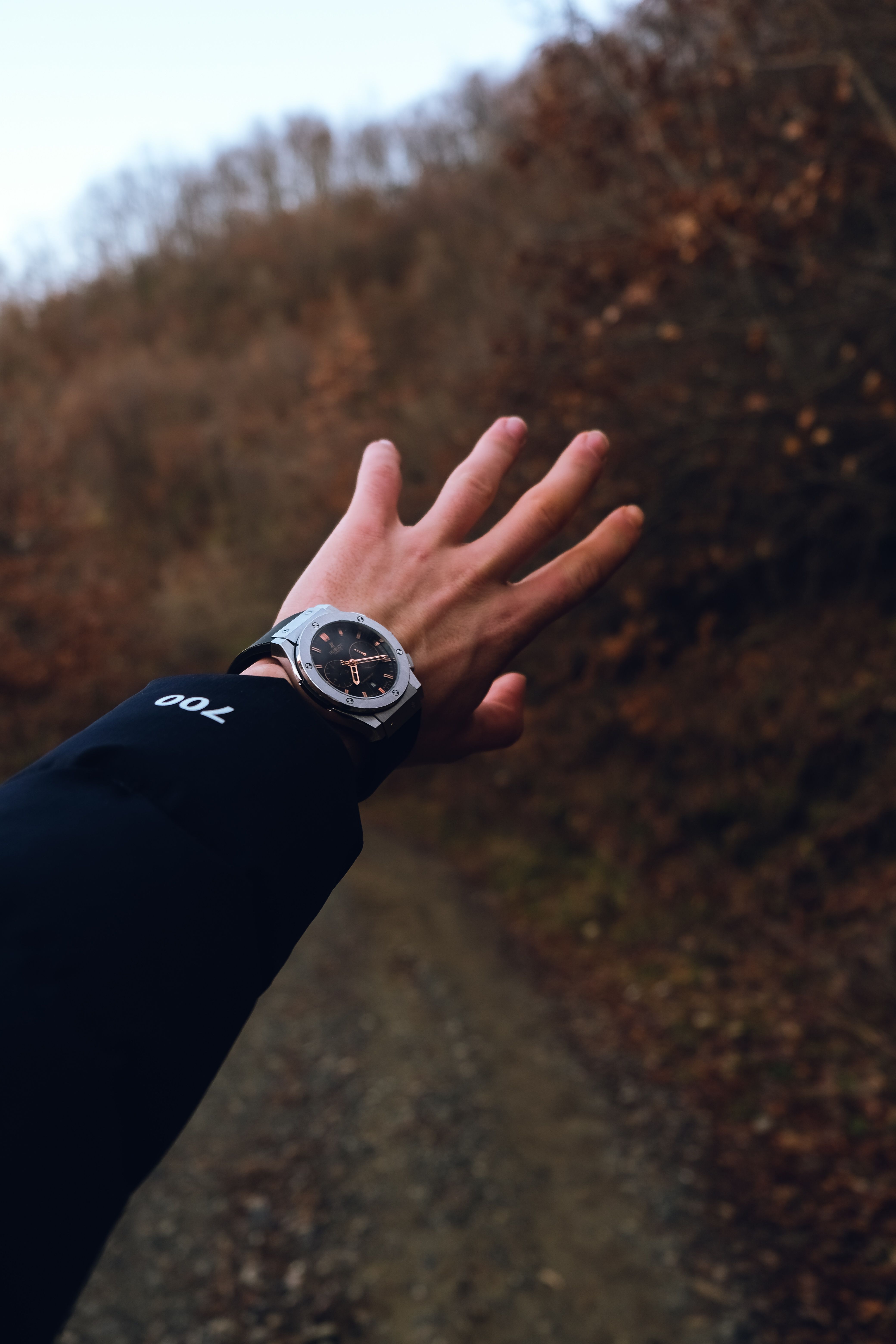 Man Hand Holding Modern Wristwatch · Free Stock Photo
