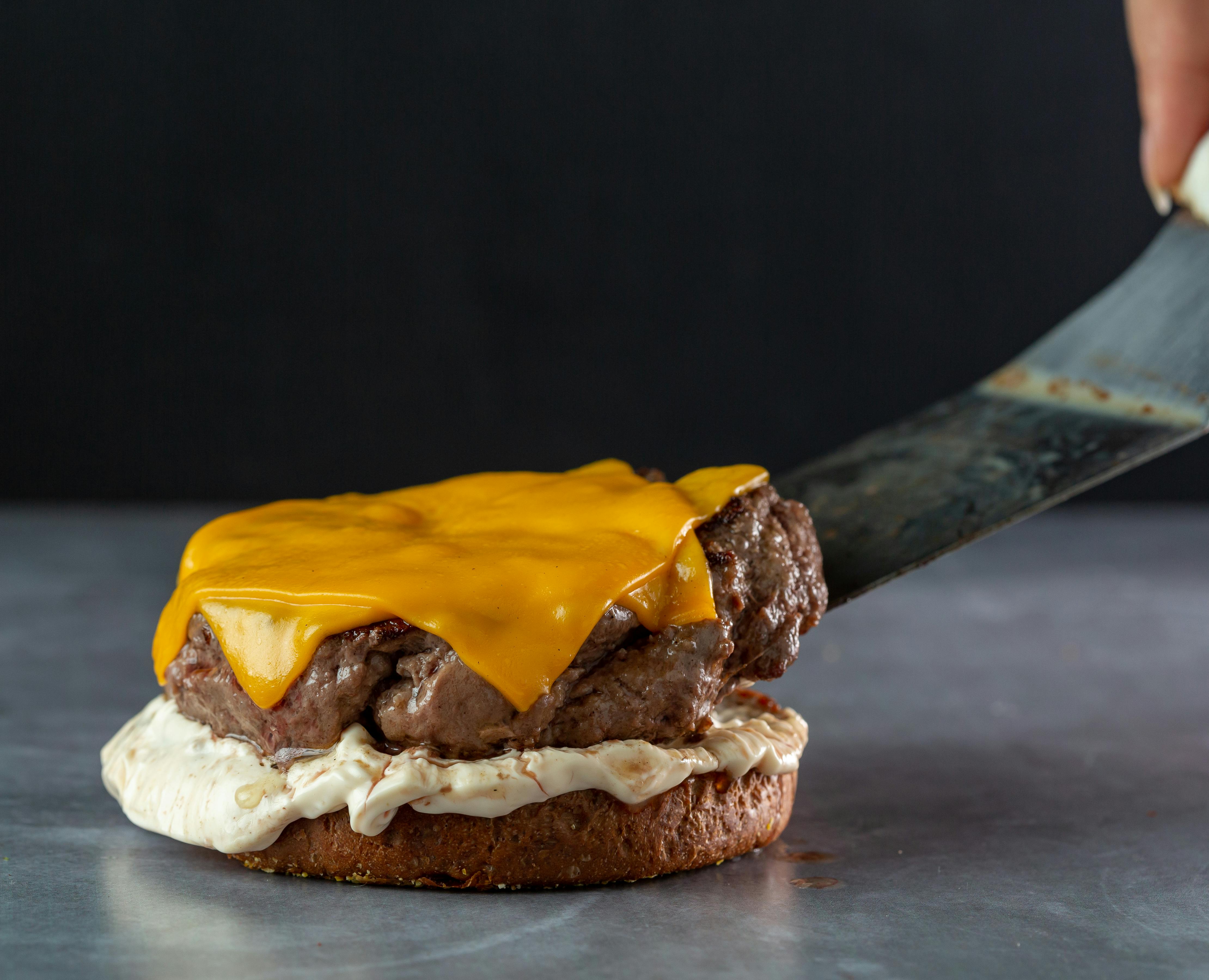 Close Up Photo of a Cheeseburger · Free Stock Photo