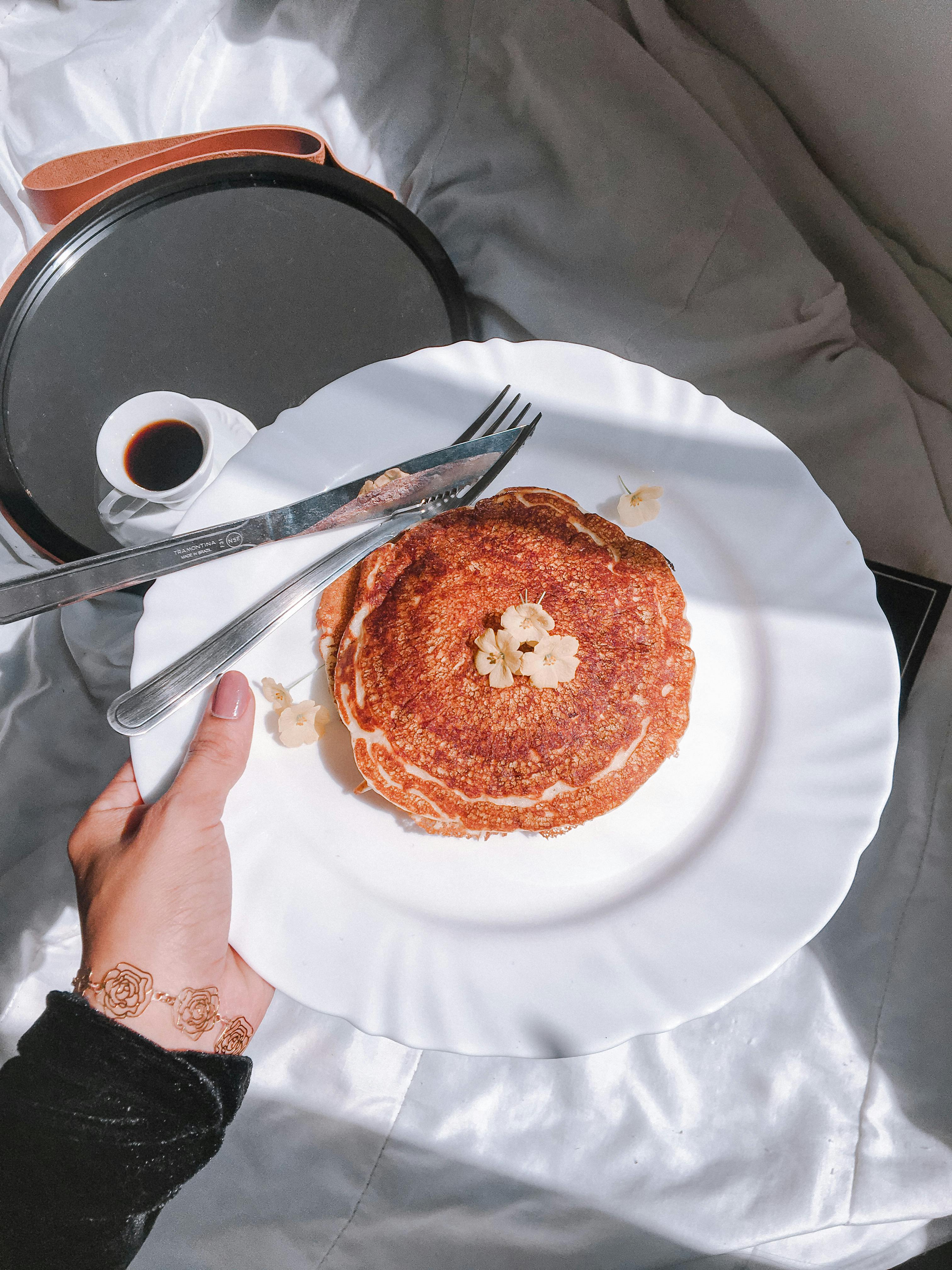 Person Holding Pancakes · Free Stock Photo