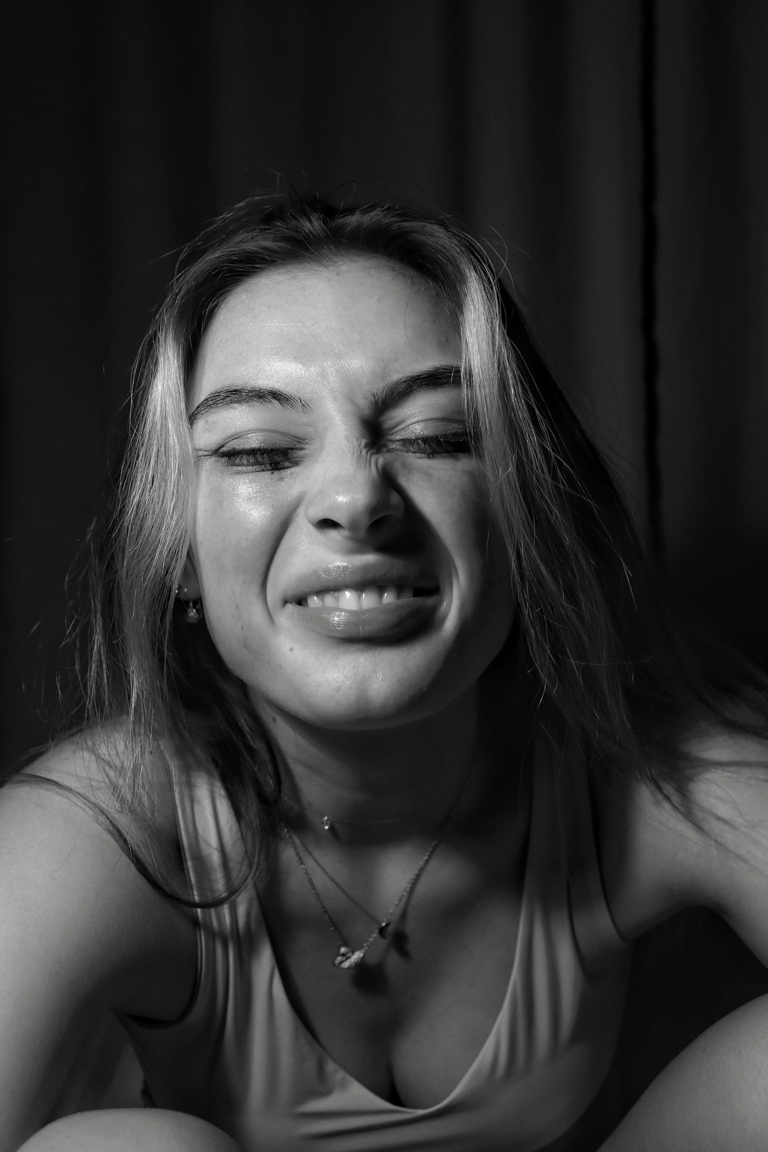 Young Woman Scrunching Her Nose · Free Stock Photo