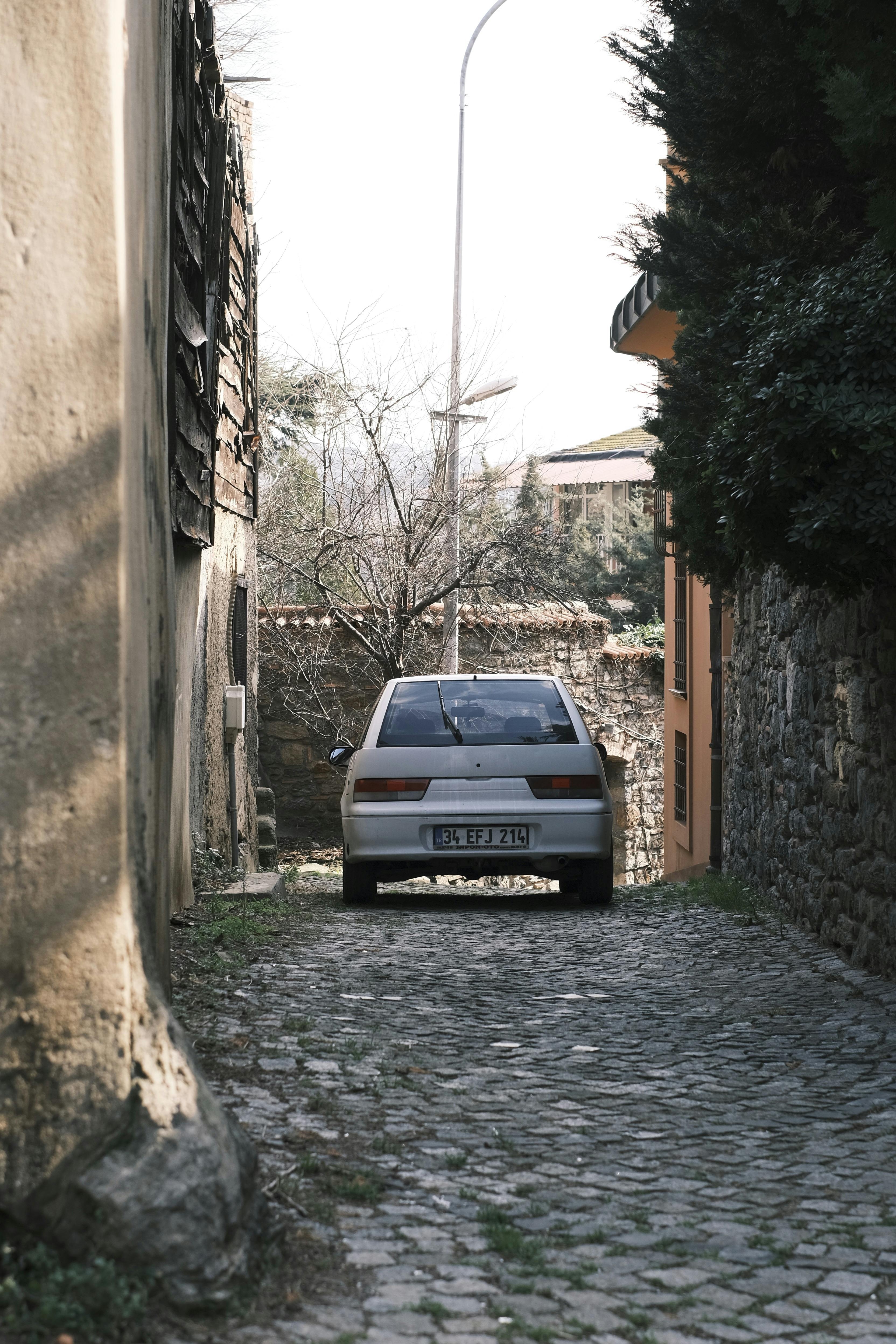 Car Parked in an Alley · Free Stock Photo