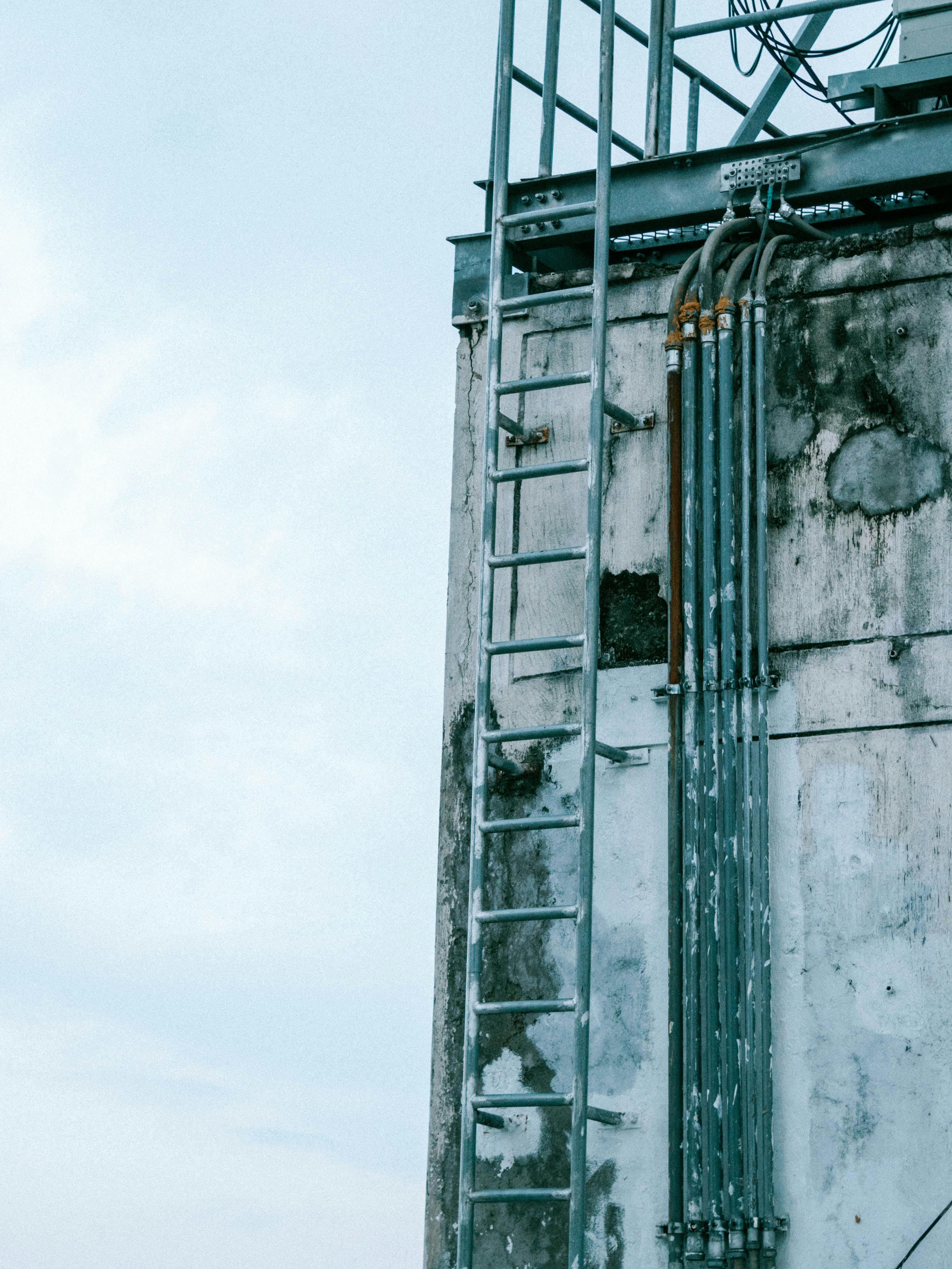Close-up of a Metal Ladder Outside of a Building · Free Stock Photo