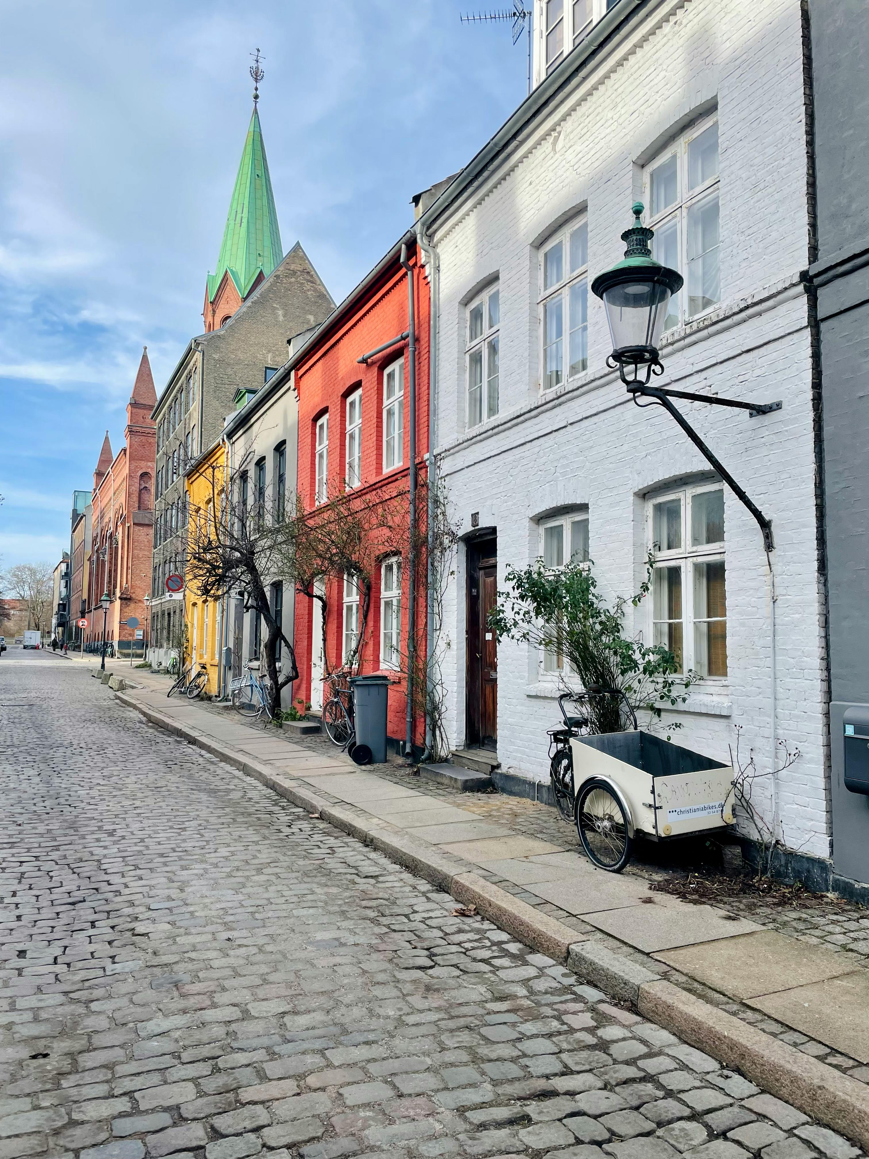 Empty Town Street with Cobblestone, and Green Tower in Perspective ...