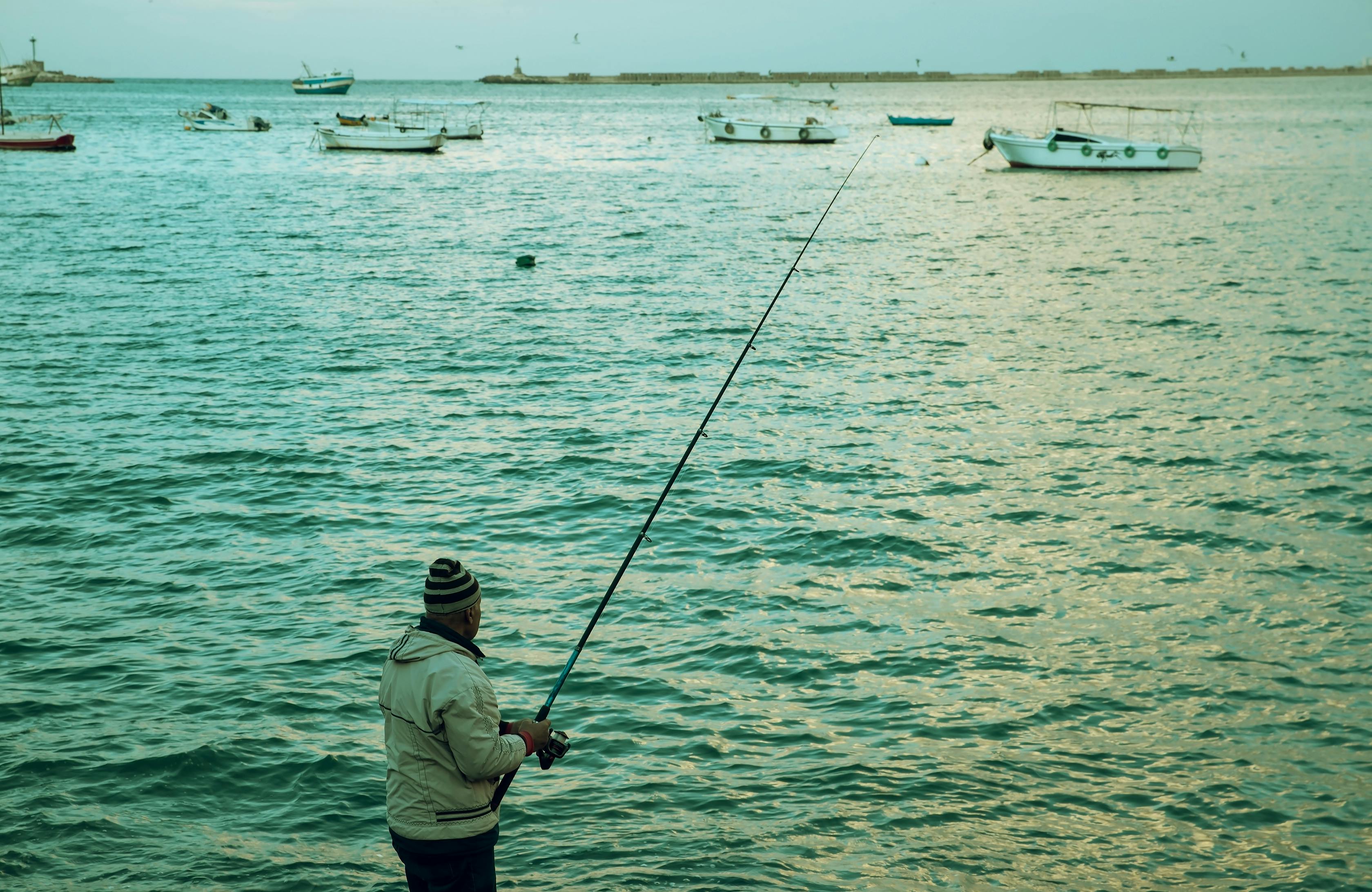 Man with Fishing Rod · Free Stock Photo