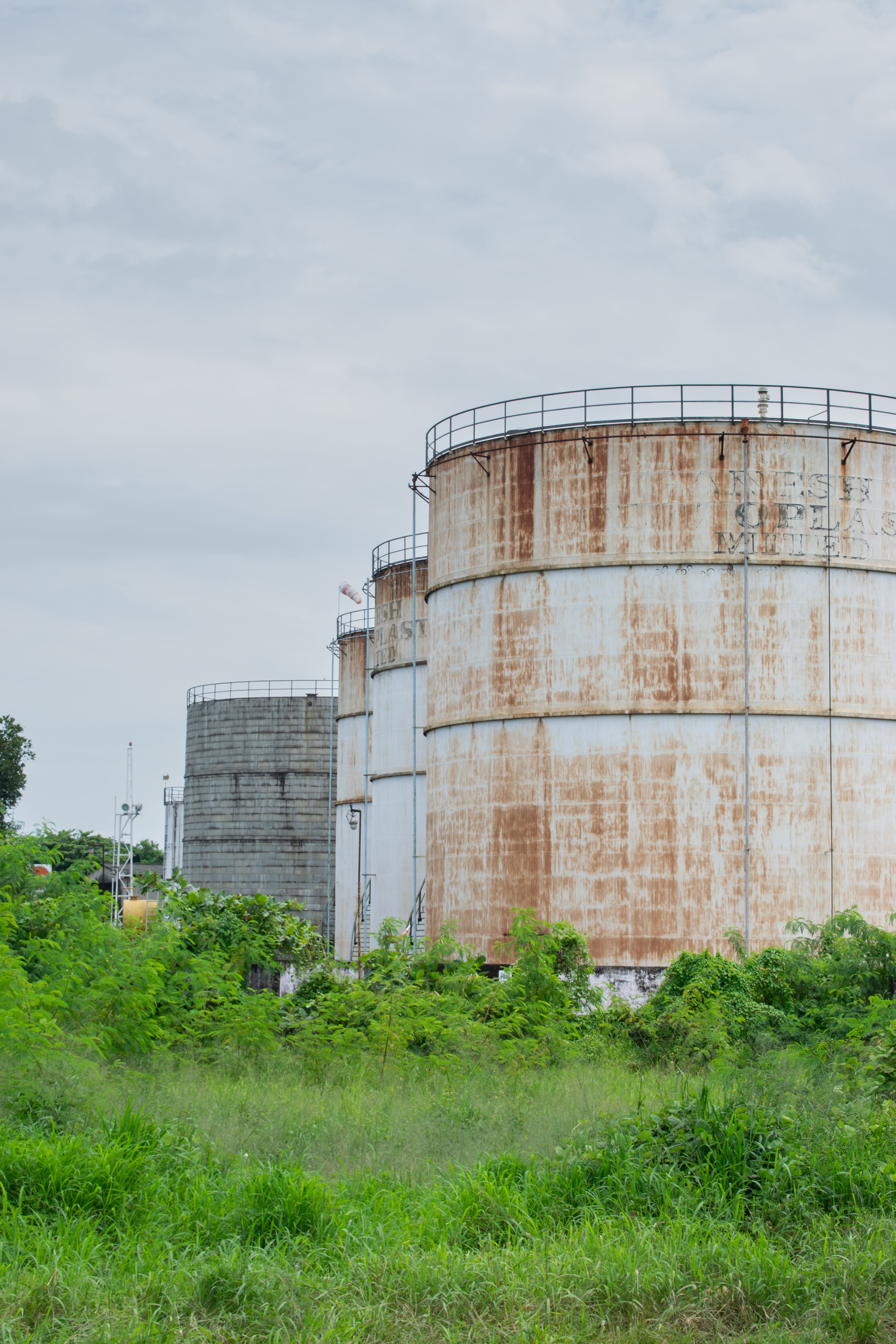 Silos by Railway Line · Free Stock Photo
