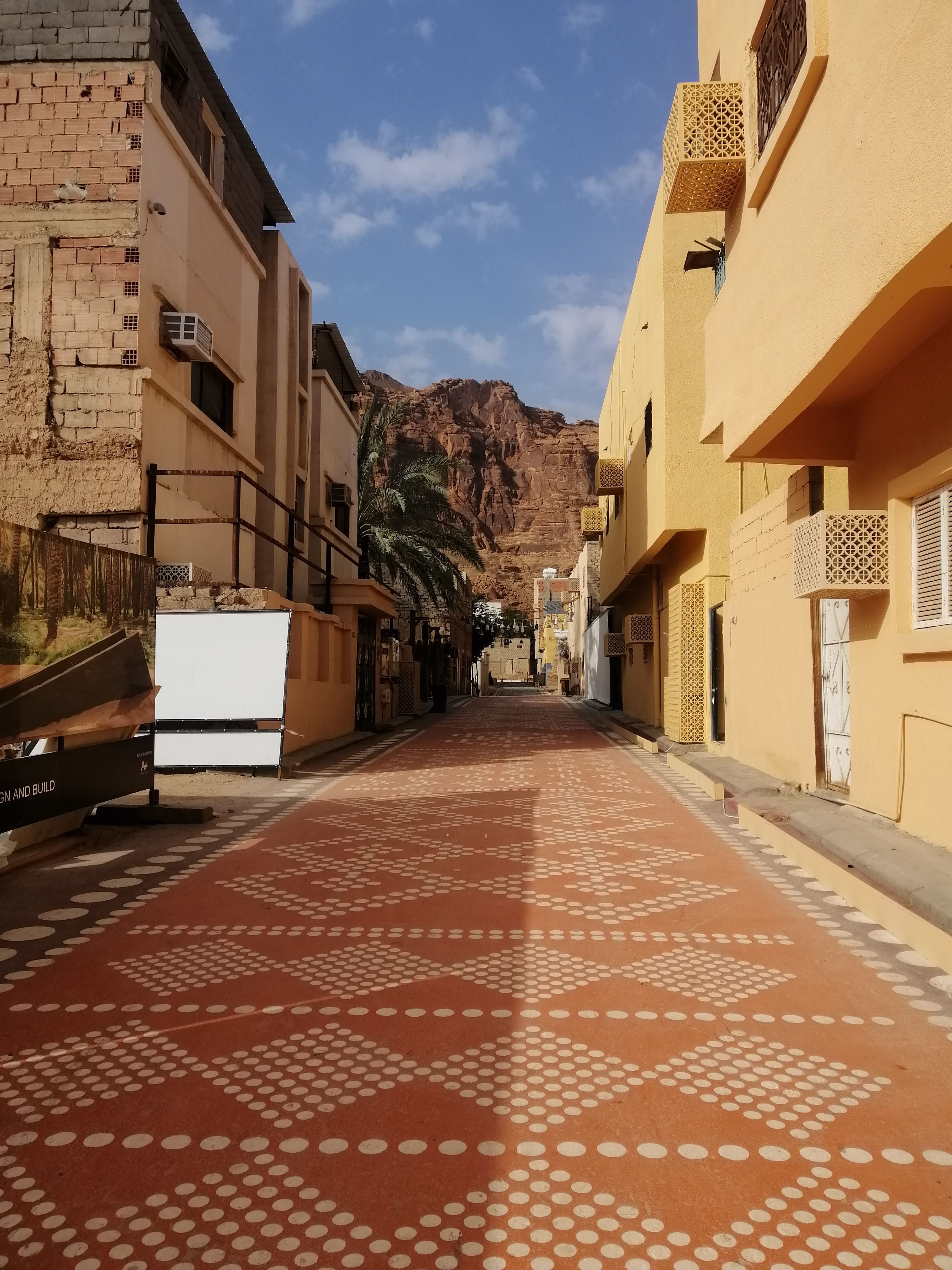 A Mosaic Pavement and Traditional Buildings in a Desert Town · Free ...