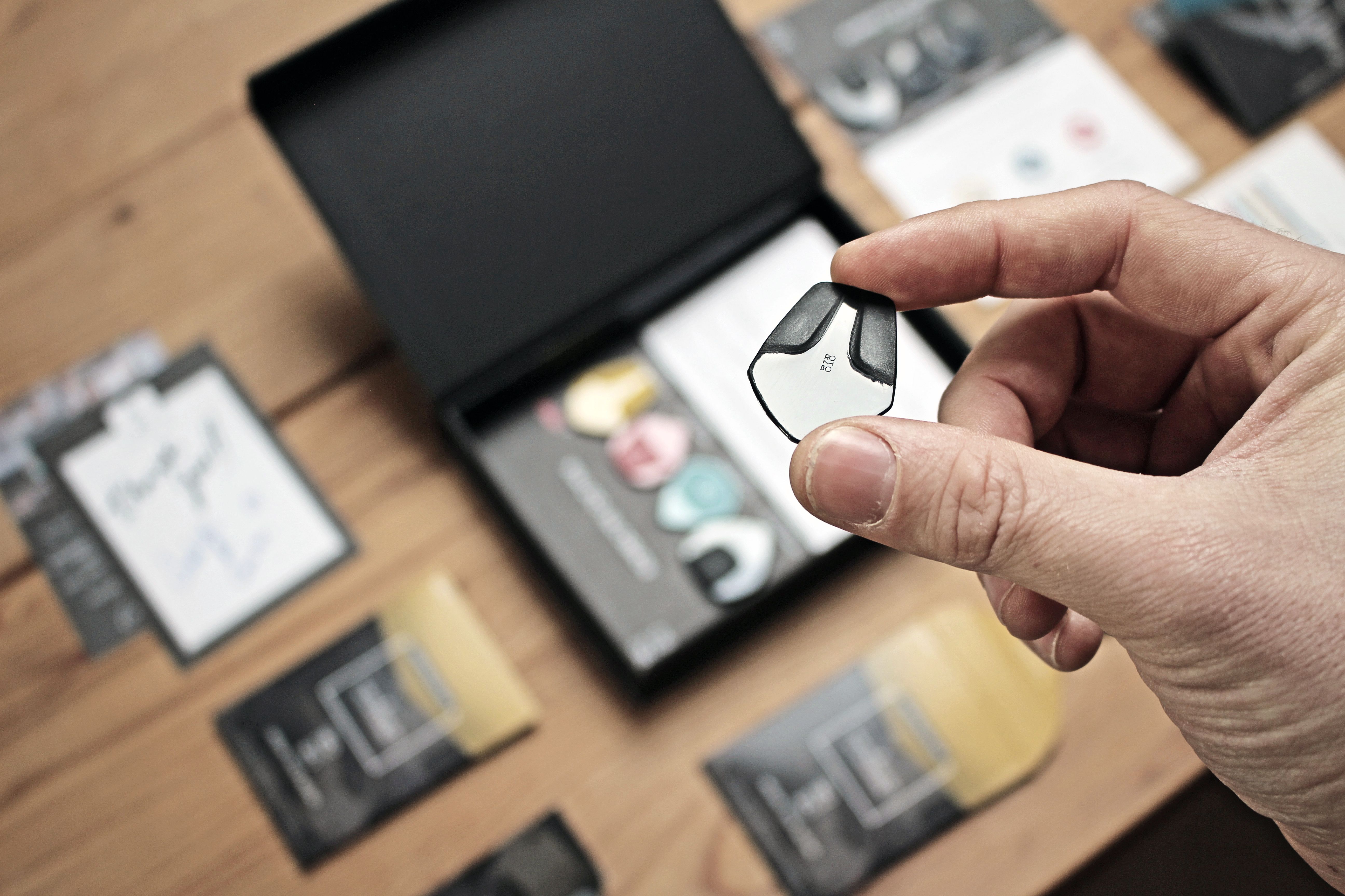 Man Hand Holding Guitar Pick · Free Stock Photo
