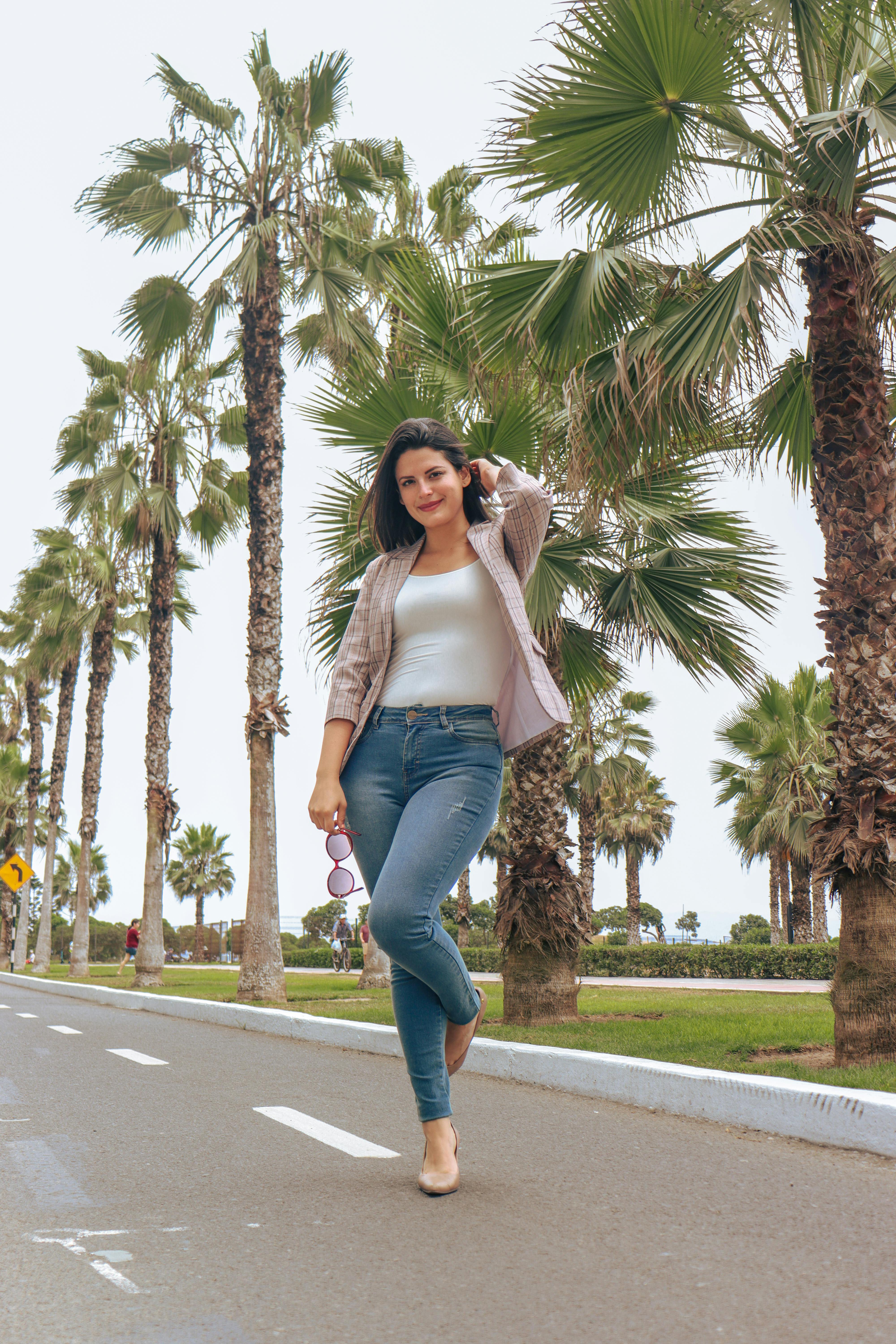 Woman Standing on a Road · Free Stock Photo
